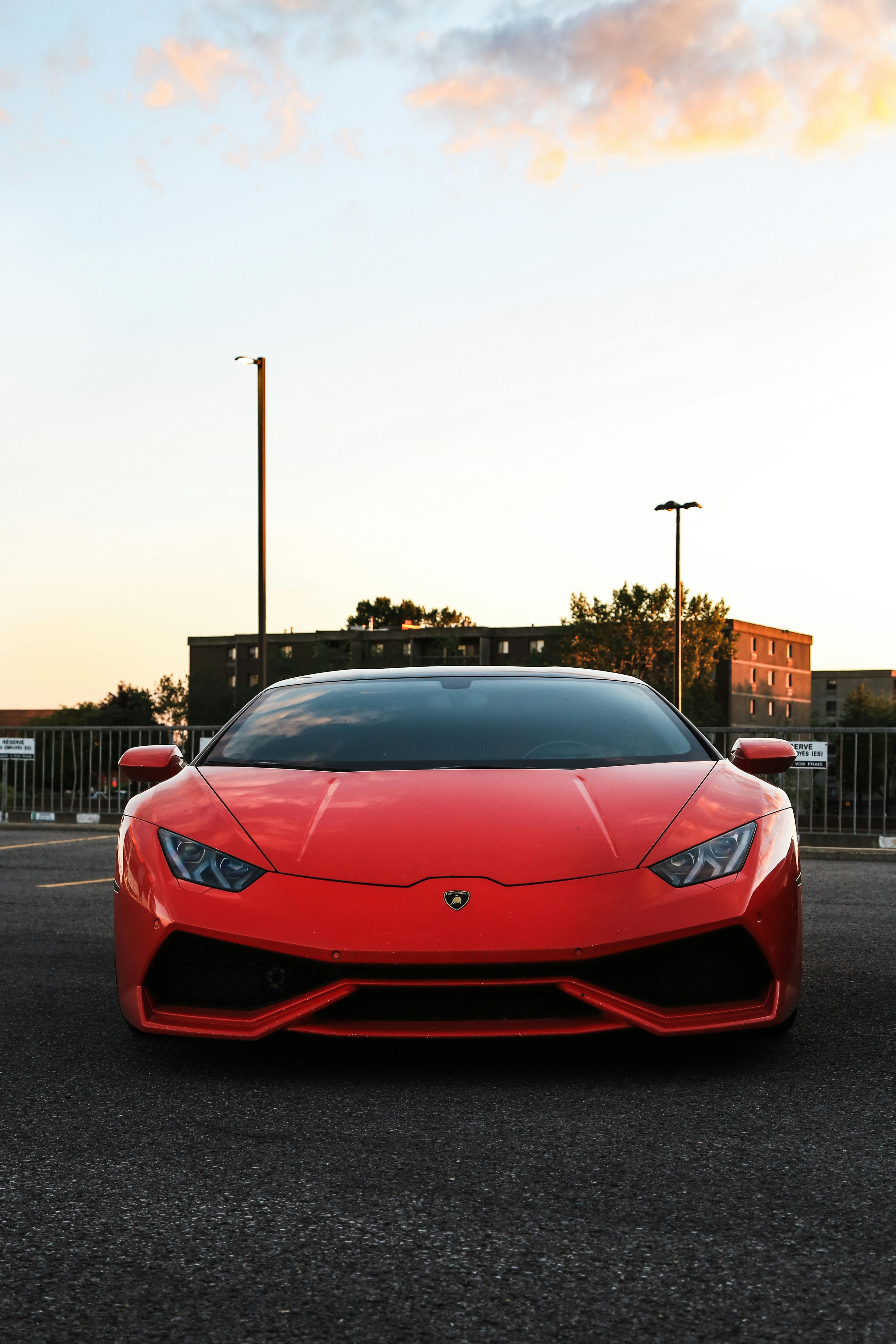 Red Sports Car Parked on the Road · Free Stock Photo