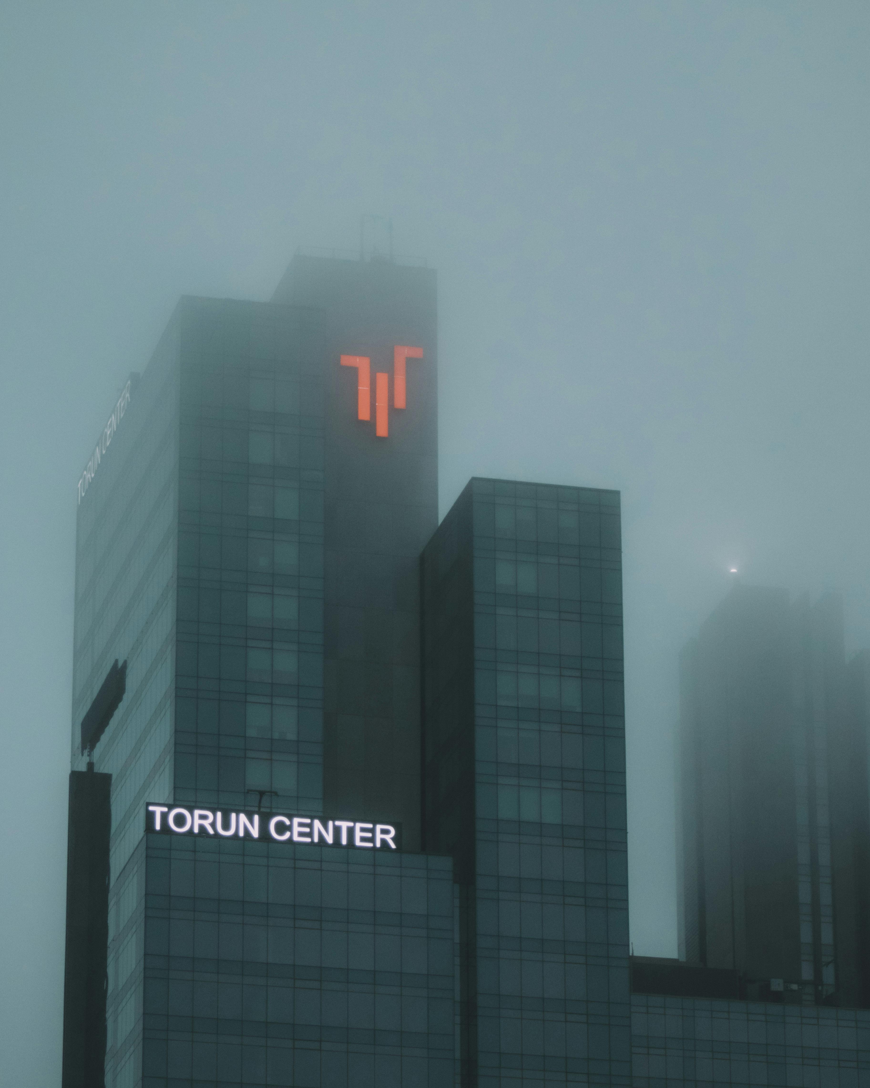 Aerial View of City Buildings with Fog · Free Stock Photo