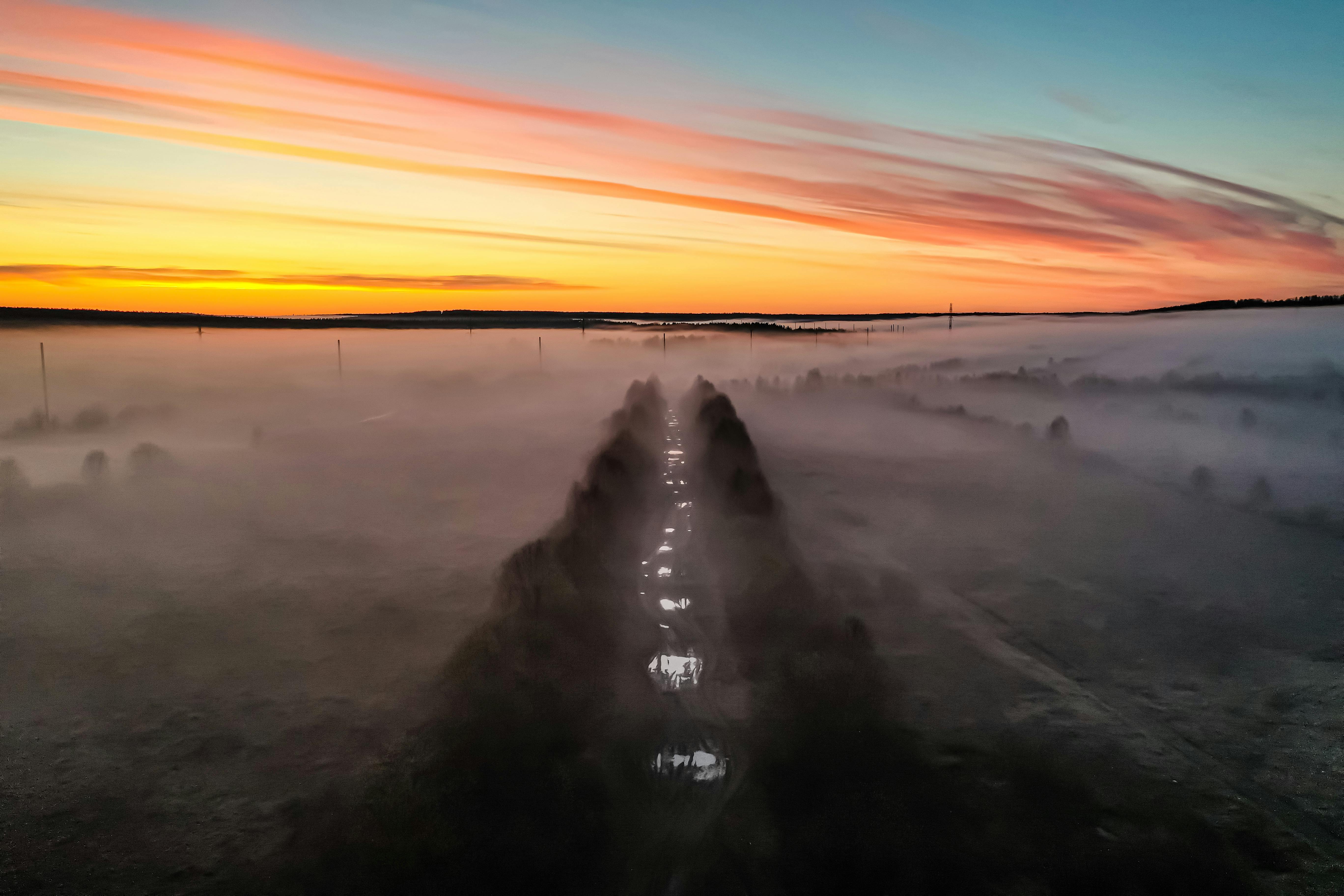 Sunset over Fog over Road · Free Stock Photo