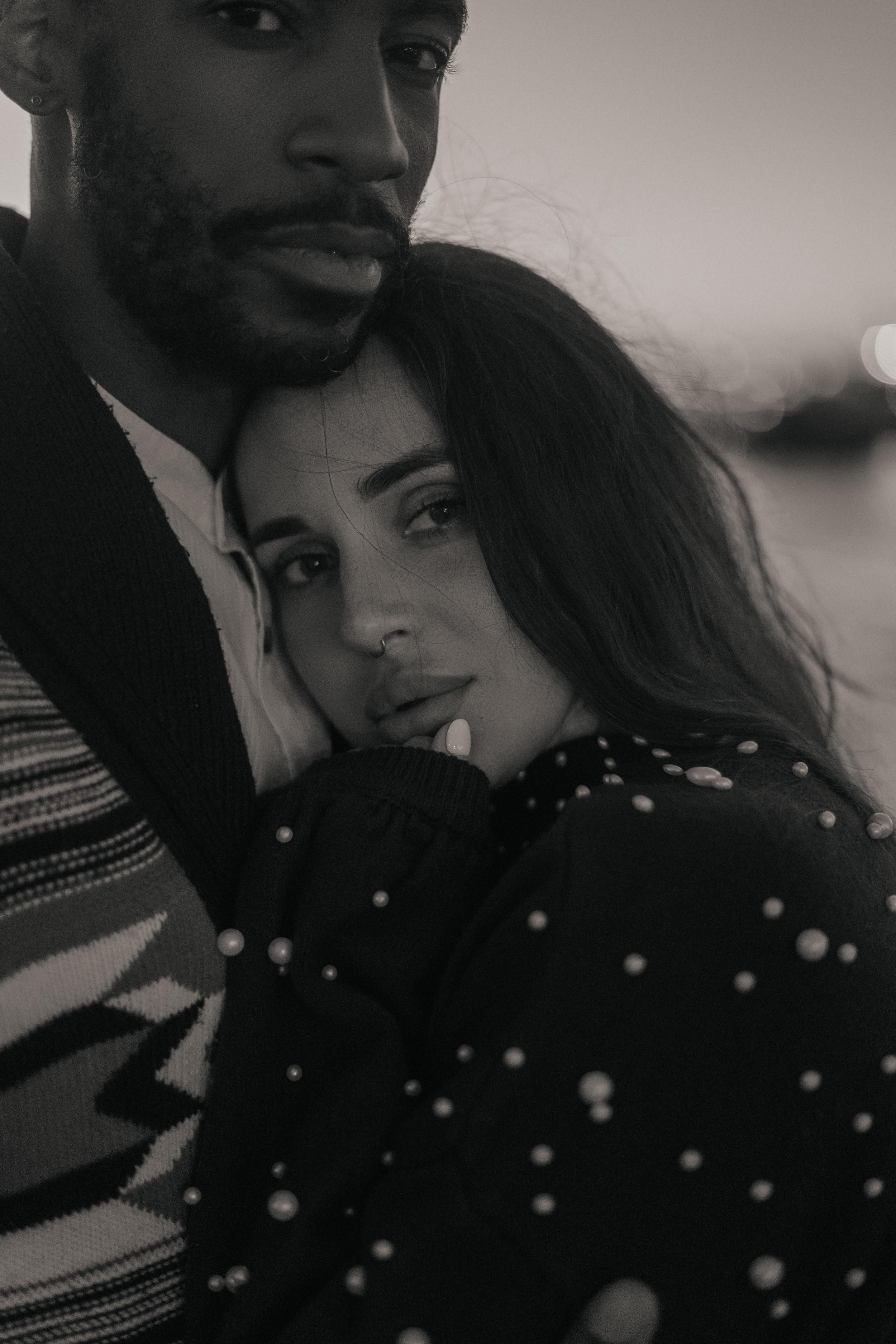 Grayscale Photo of a Romantic Couple Hugging · Free Stock Photo