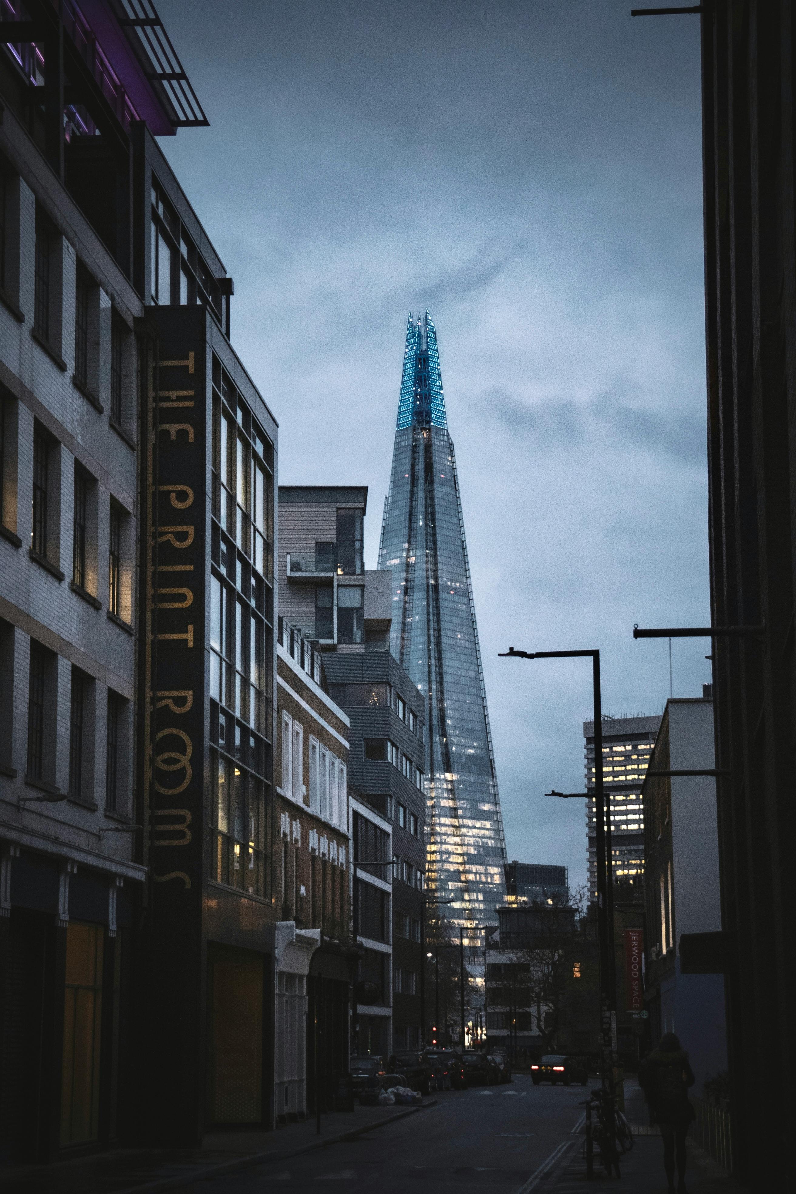Cottons Center Office Building and the Shard Skyscraper in London ... Cottons Center Office Building and the Shard Skyscraper in London ...