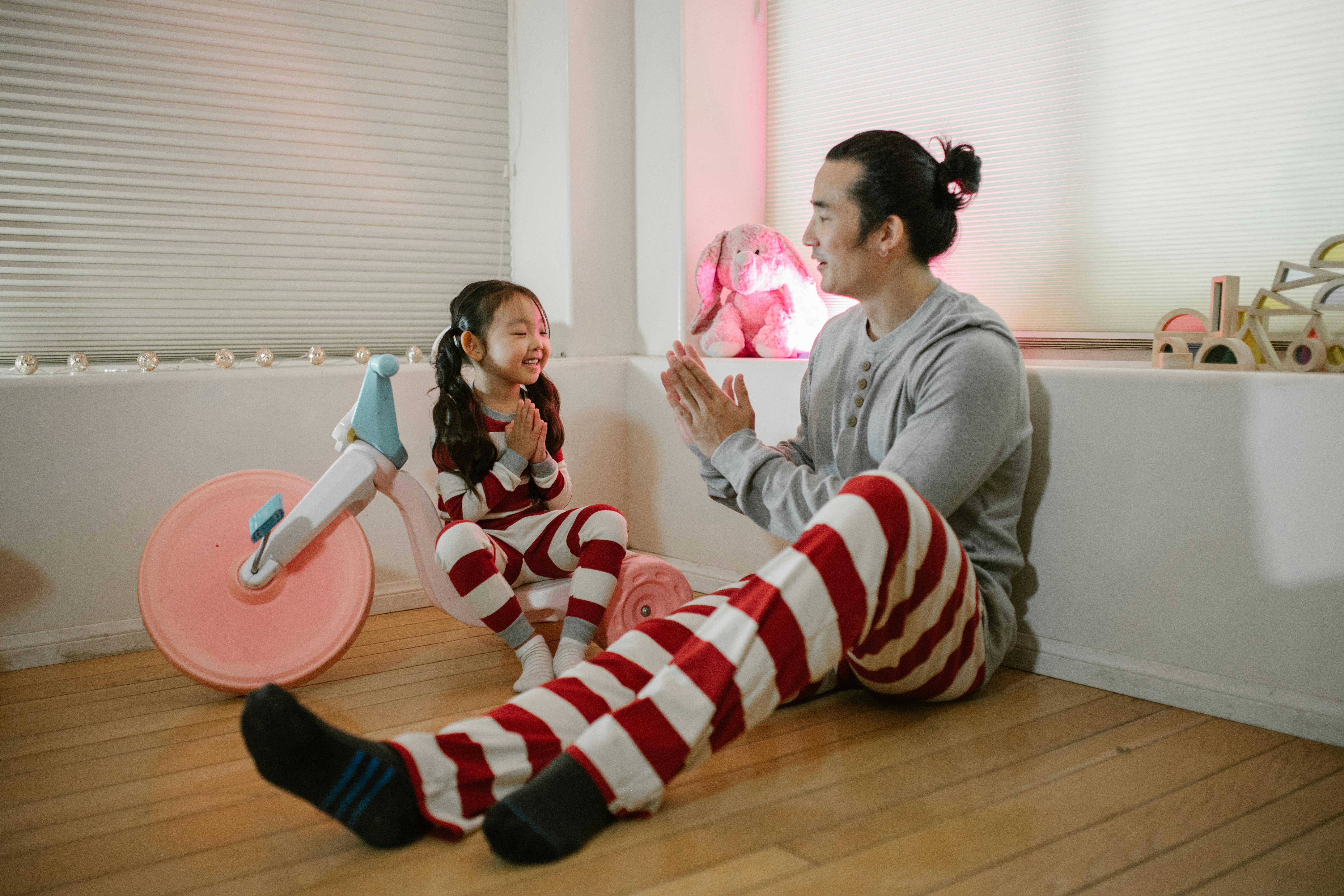 Father Playing Clapping Game with Child · Free Stock Photo