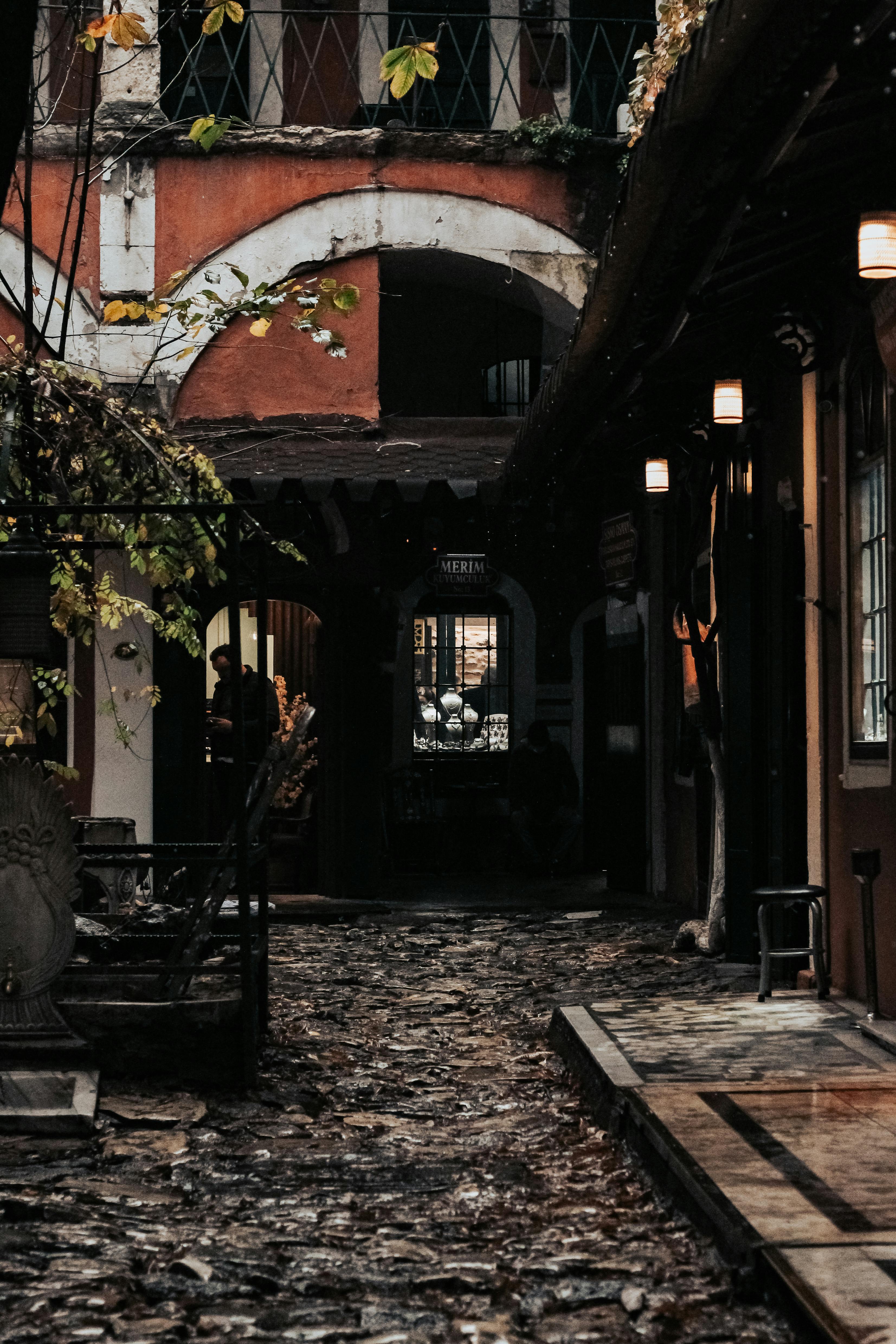 Photo of Narrow Alleyway in Between Brick Buildings · Free Stock Photo