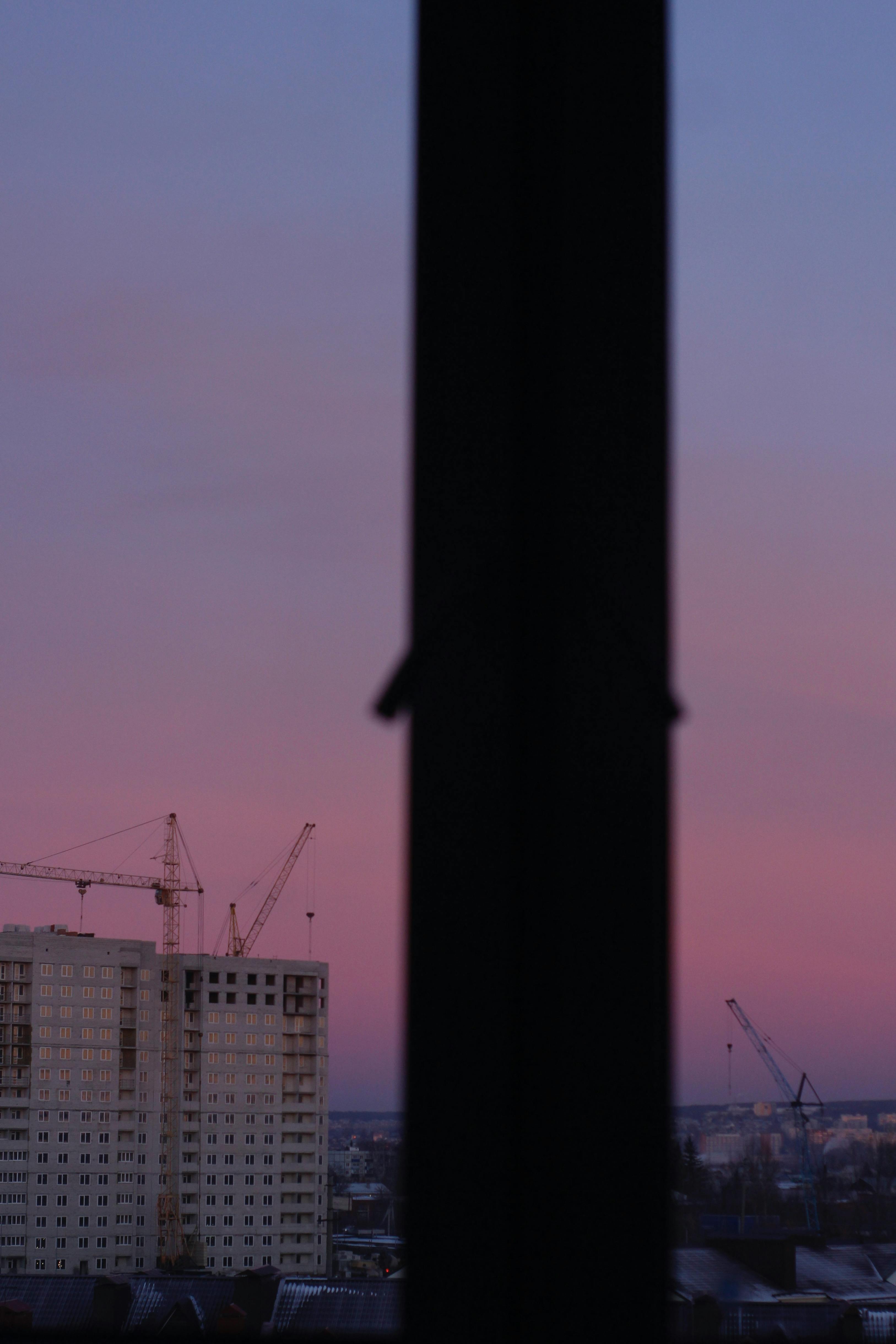 Modern Residential Blocks Complex in City at Sunset · Free Stock Photo