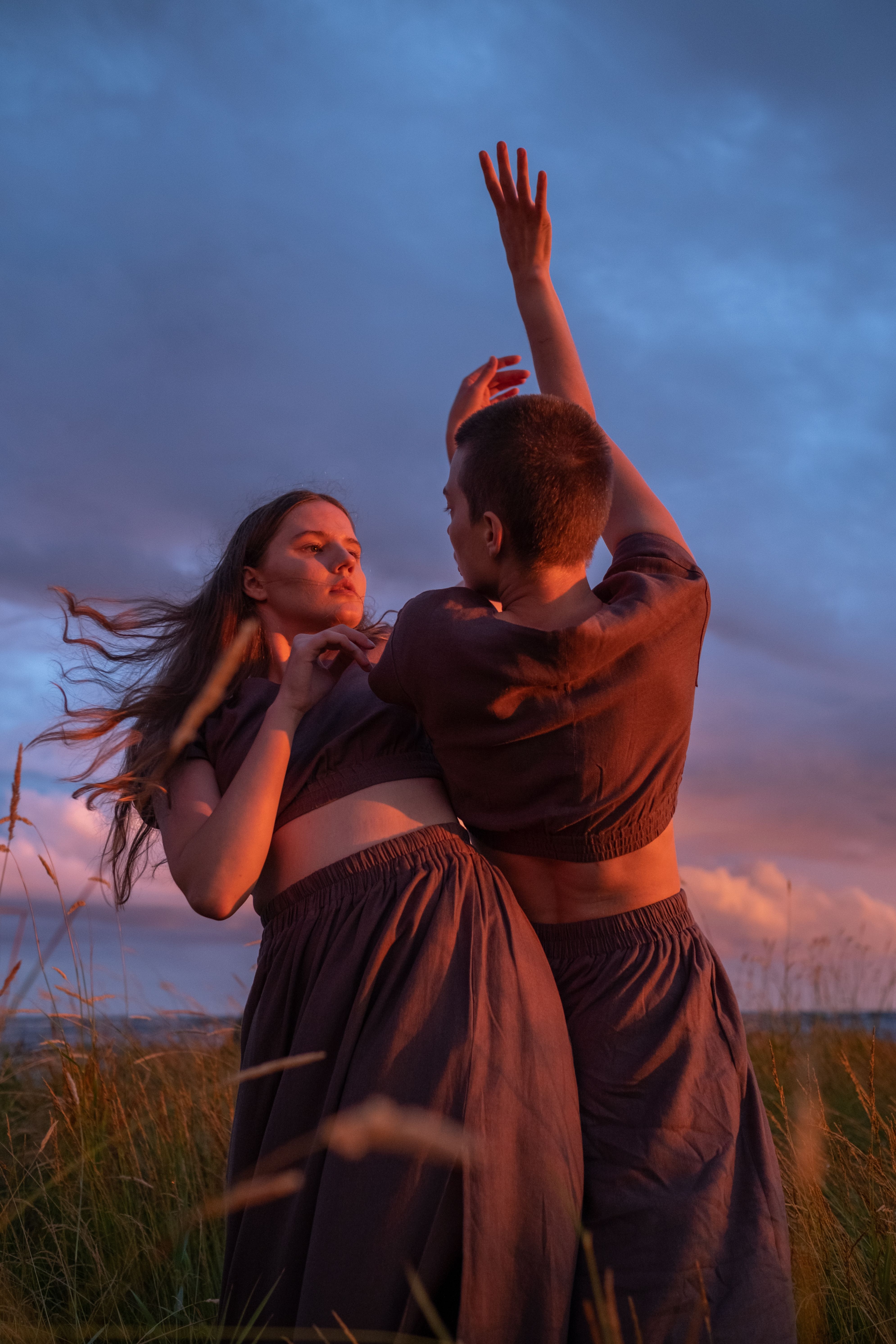 A Woman Dancing Close with a Person · Free Stock Photo
