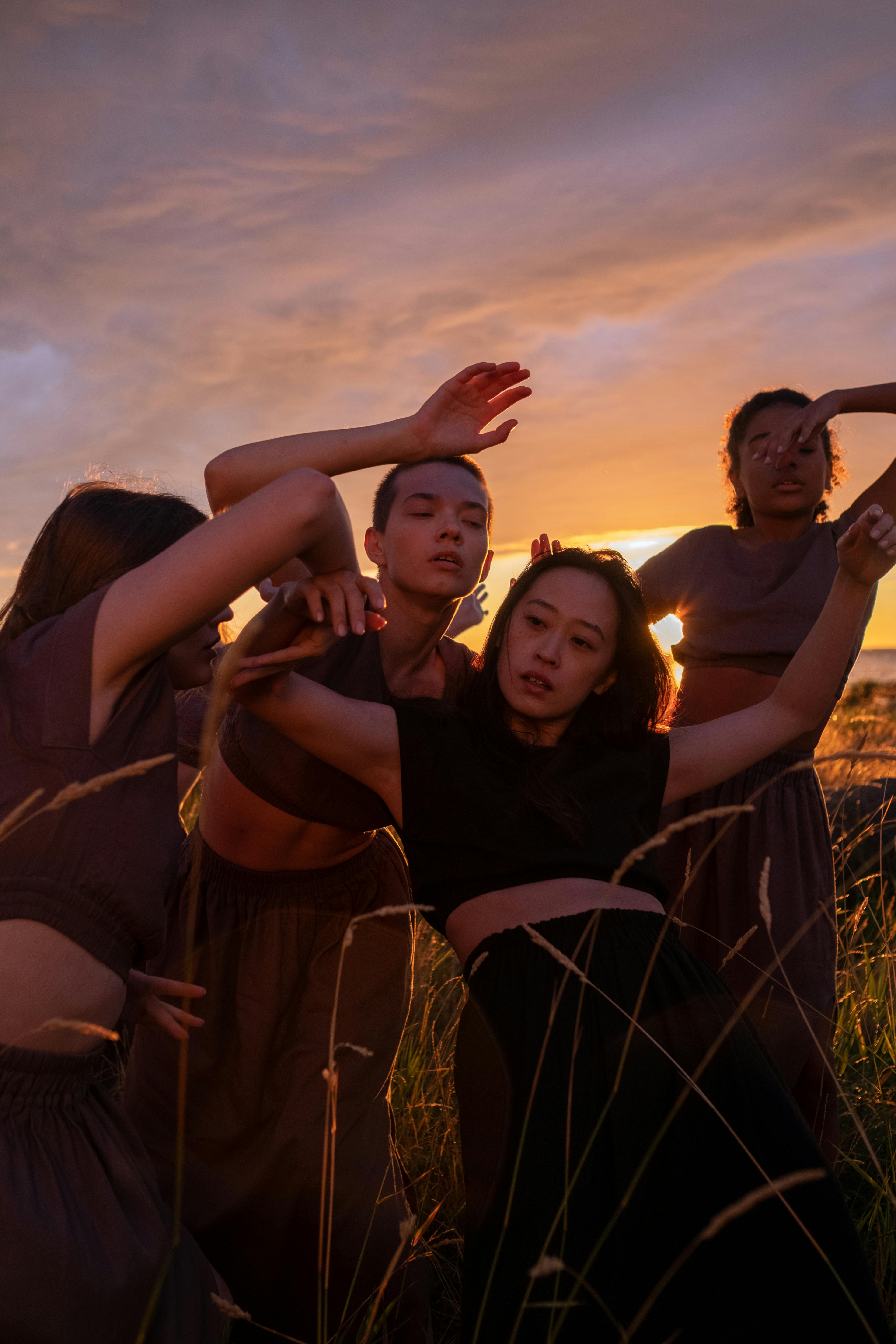 Female Models Posing Beautifully on the Camera while Standing on Wheat ...