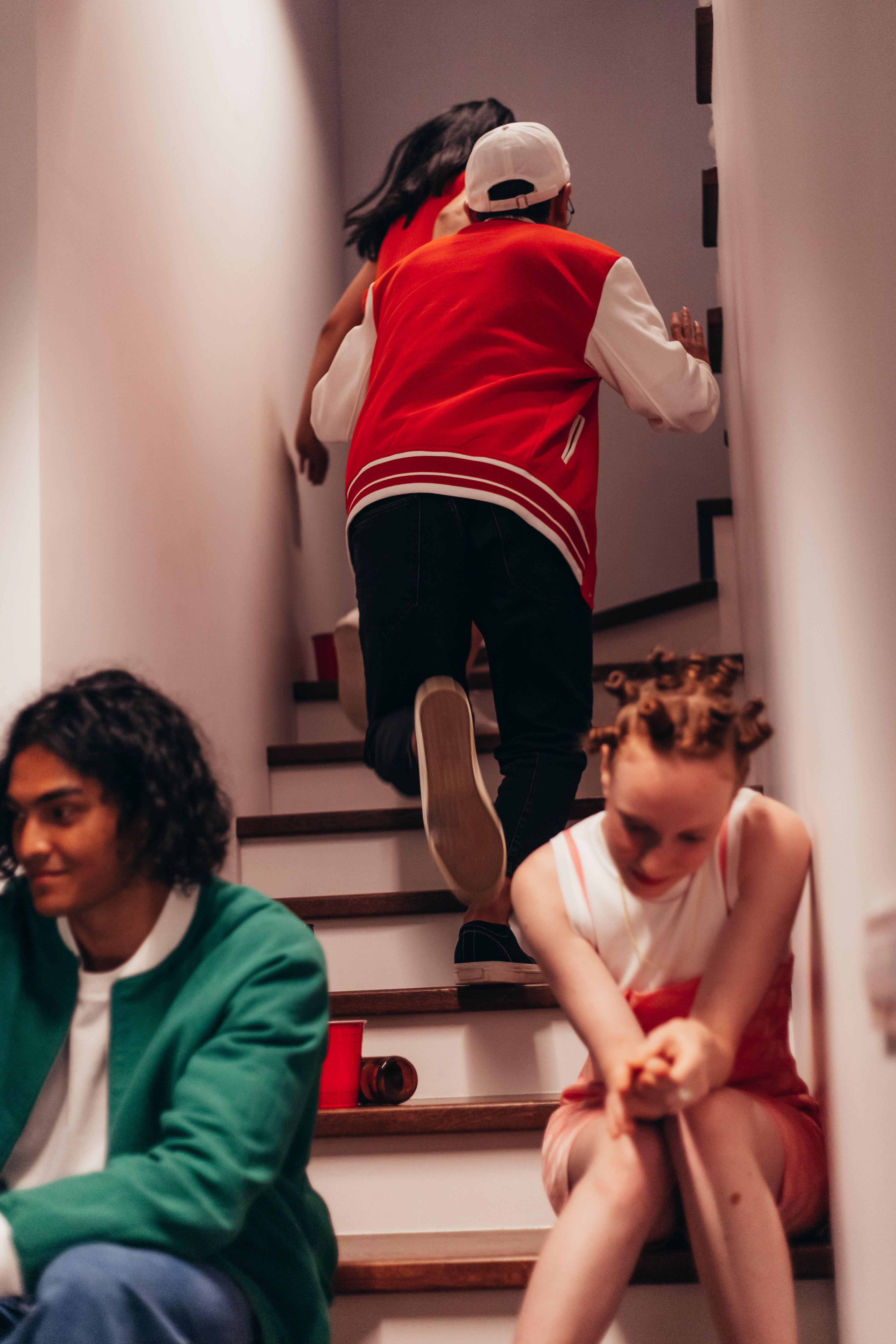 People Running and Sitting on Stairs · Free Stock Photo