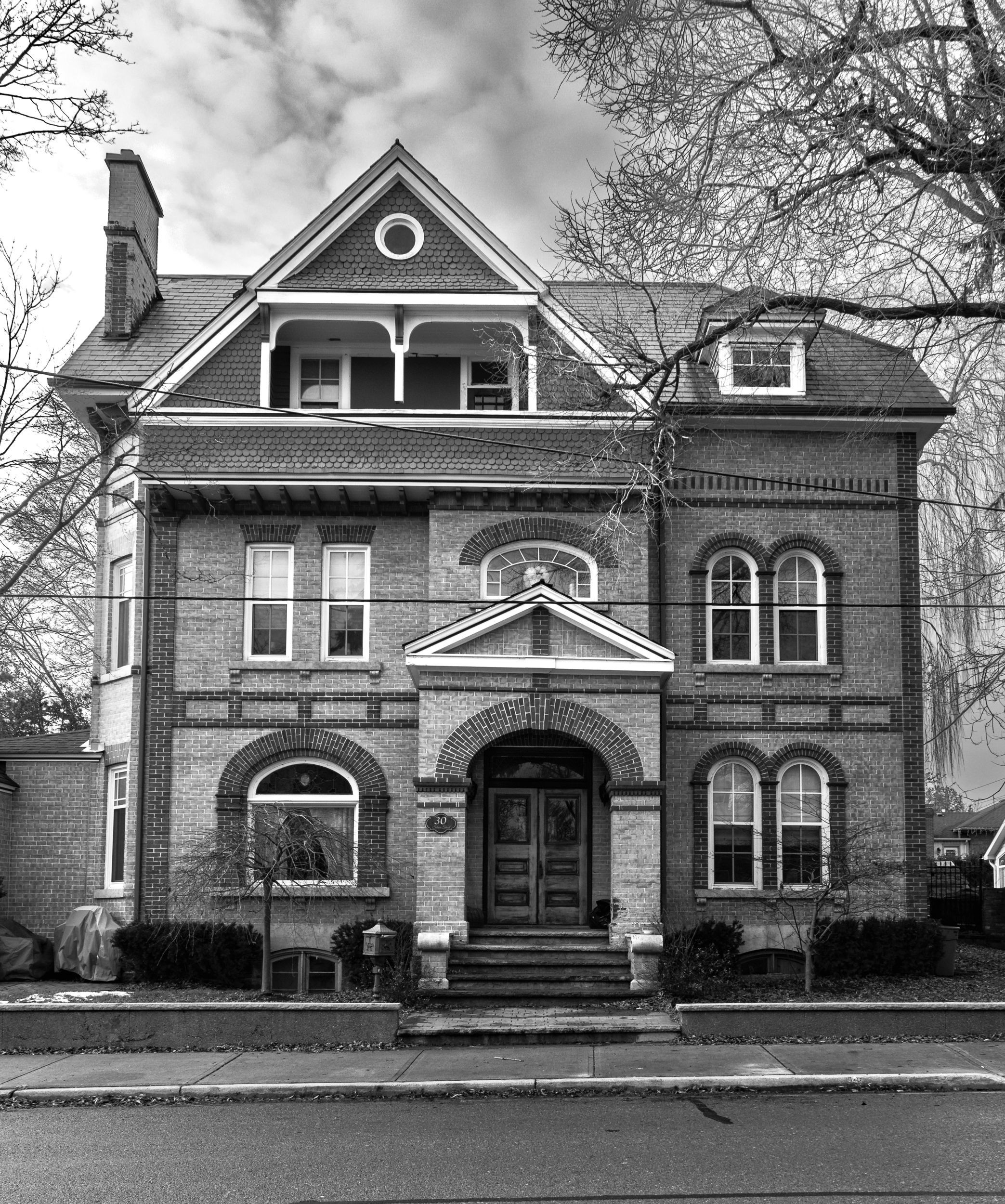 Grayscale Photo of Brick House · Free Stock Photo