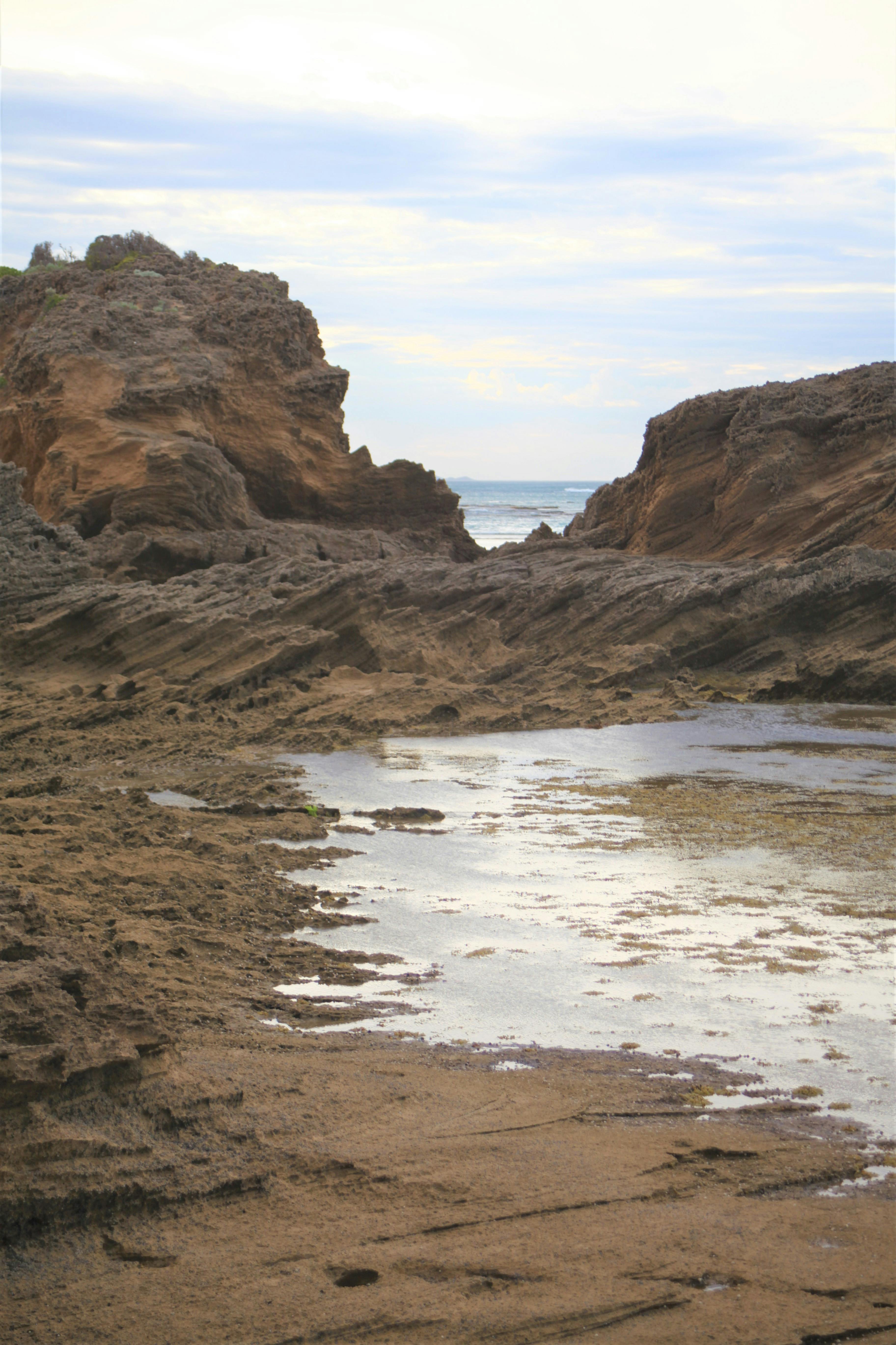 A Rock Formation on the Beach · Free Stock Photo