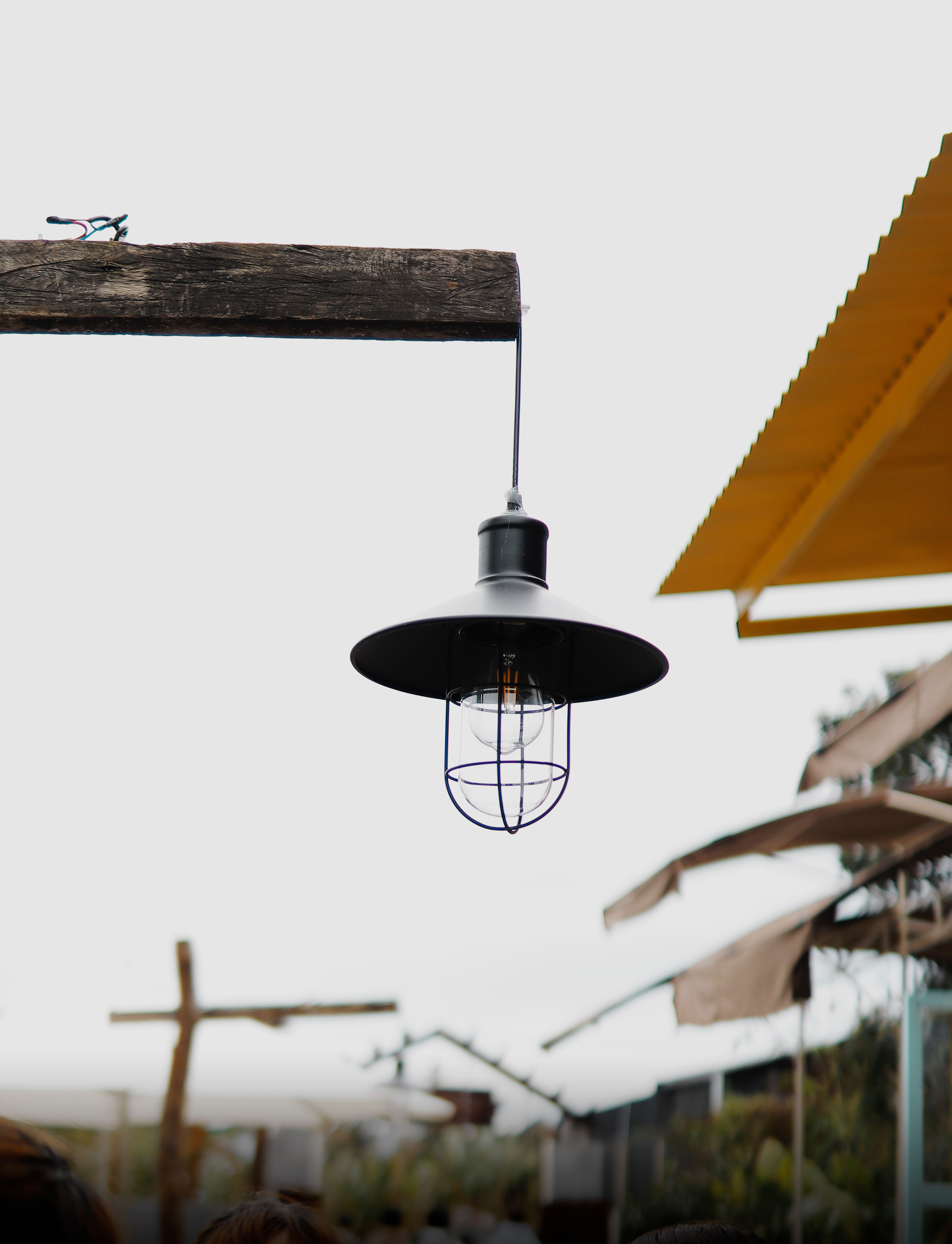 Photo of Lights Hanging from Wooden Sticks · Free Stock Photo