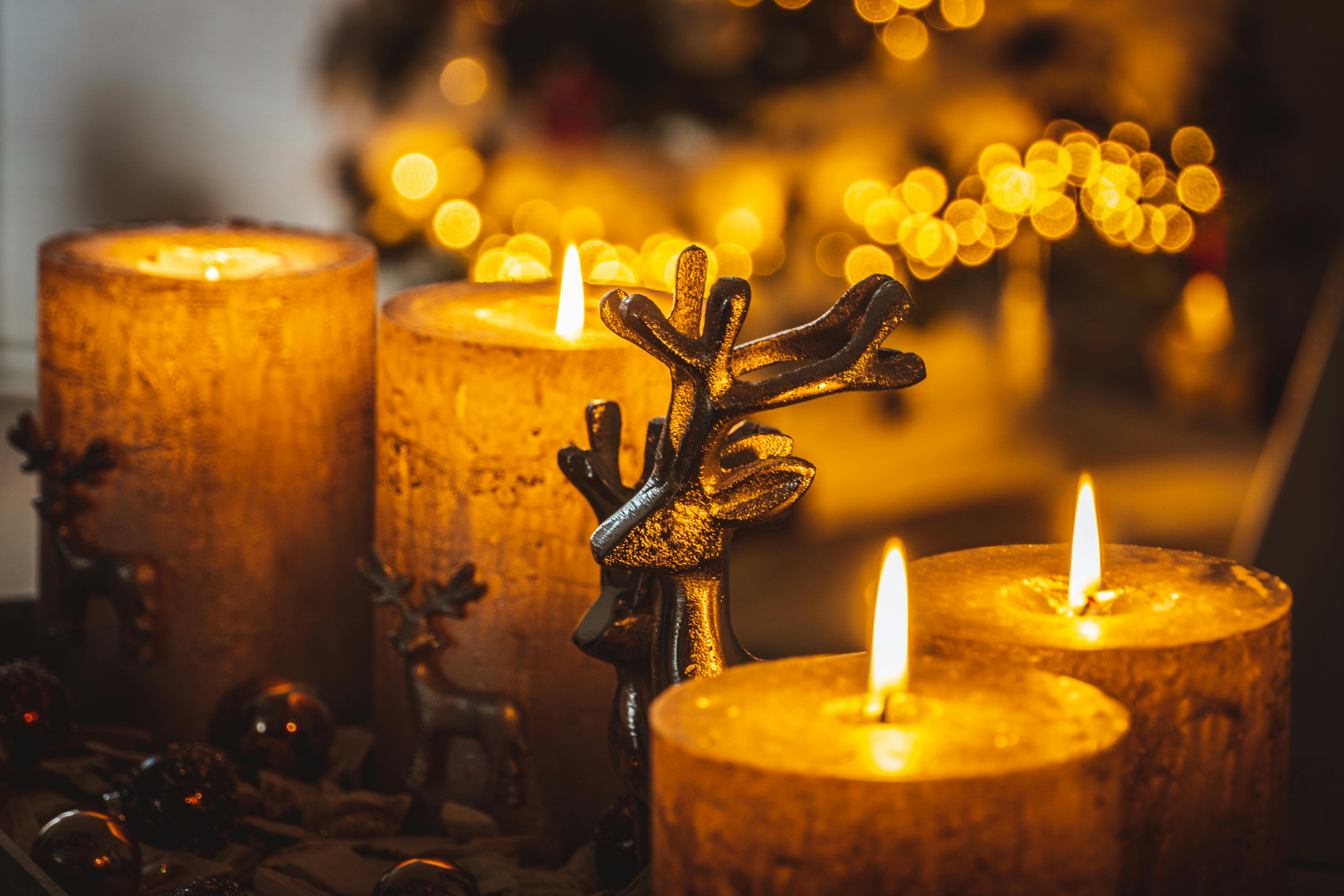 Close-Up Shot of Lighted Candles · Free Stock Photo