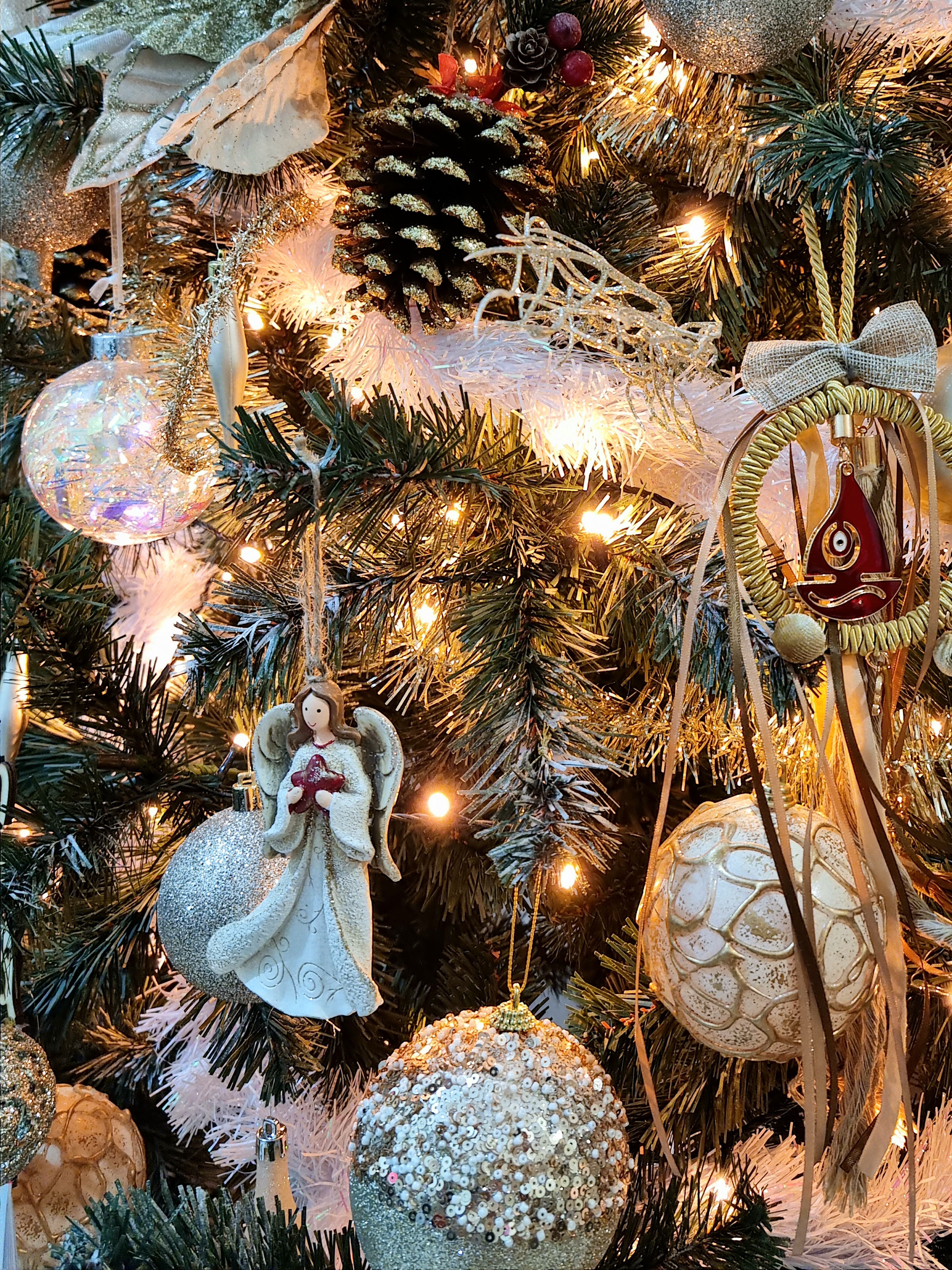 Close Up Photo of Ornaments on Christmas Tree · Free Stock Photo