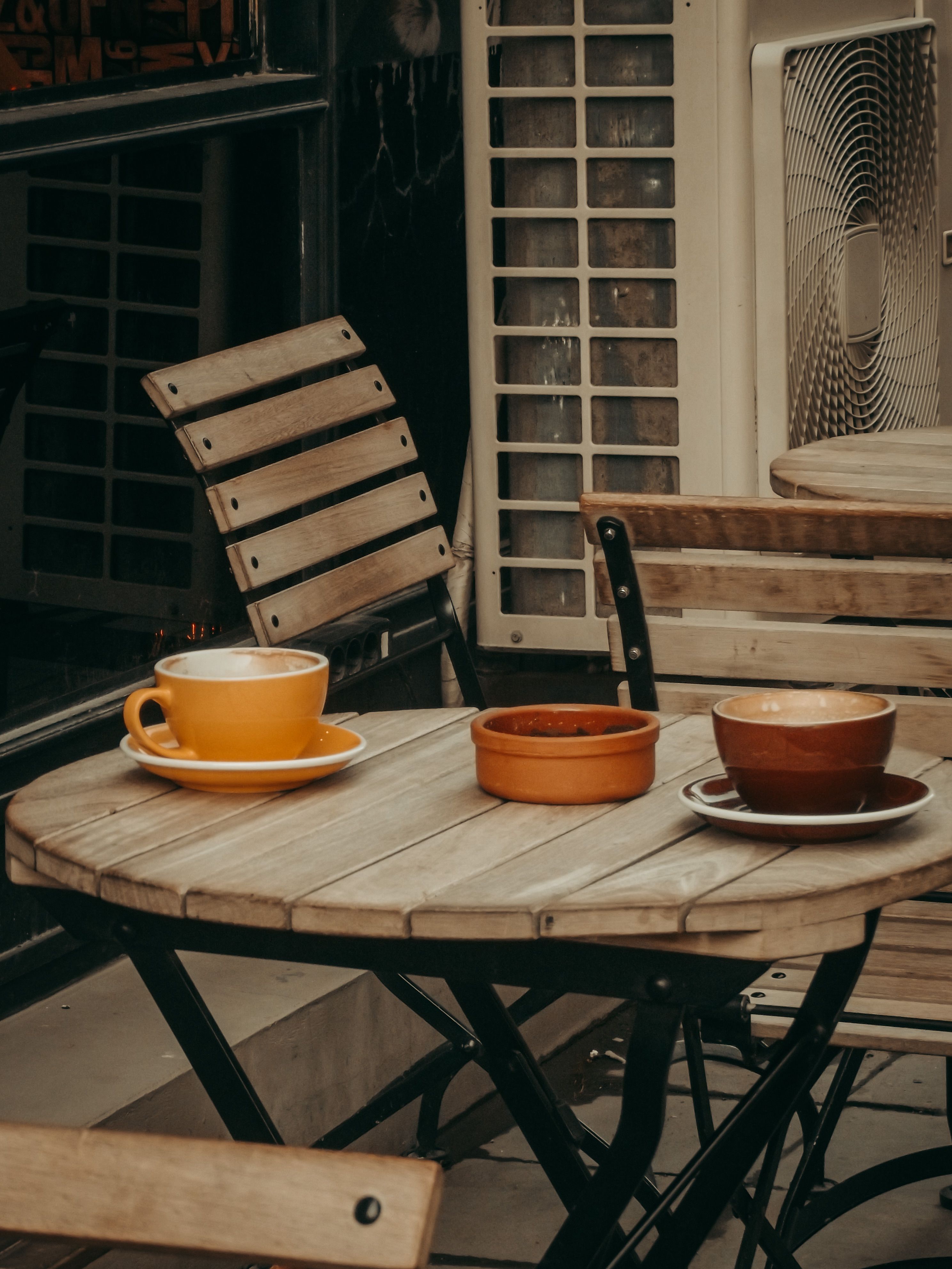 Mugs and Saucers on Wooden Table · Free Stock Photo