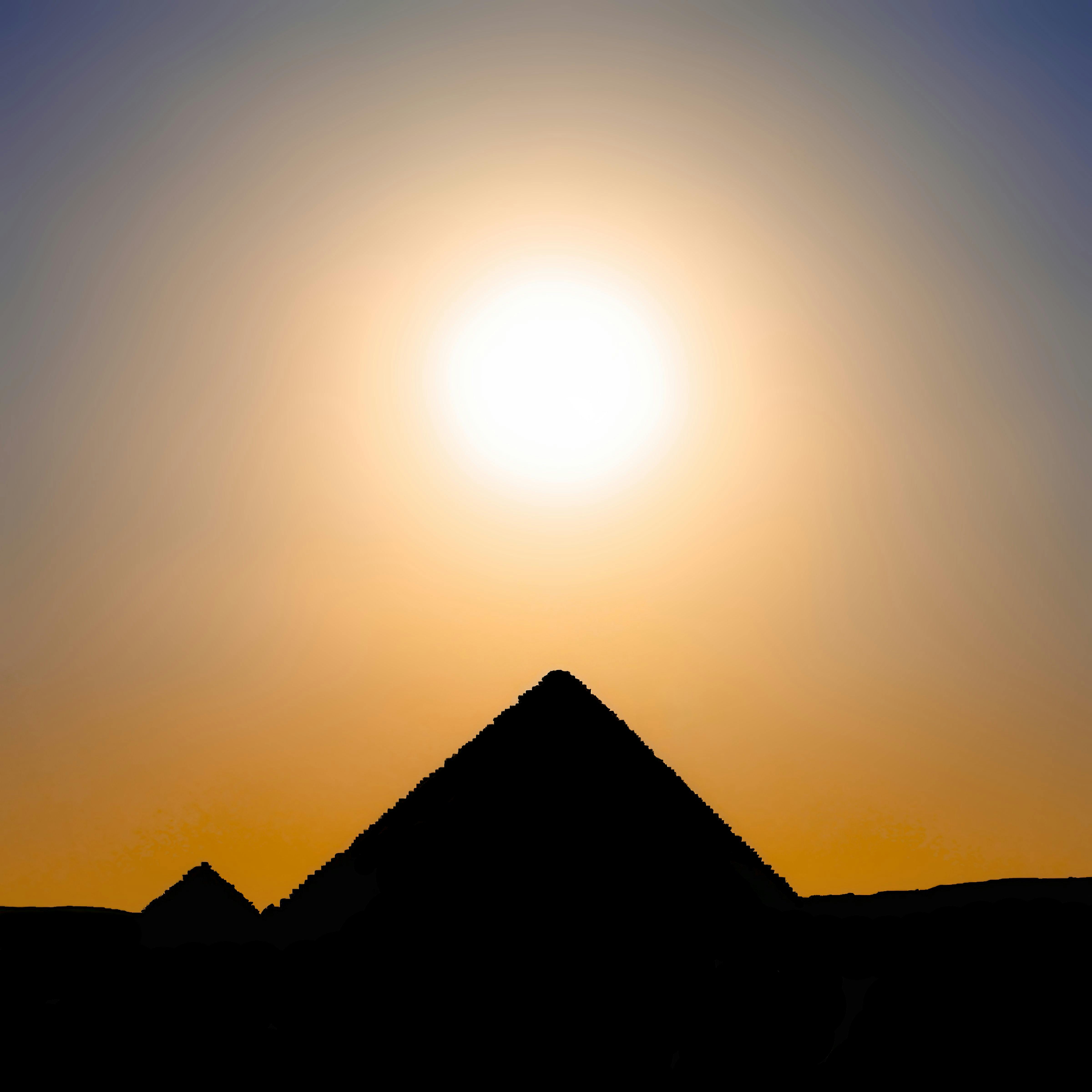 Silhouette of Pyramids during Sunset · Free Stock Photo