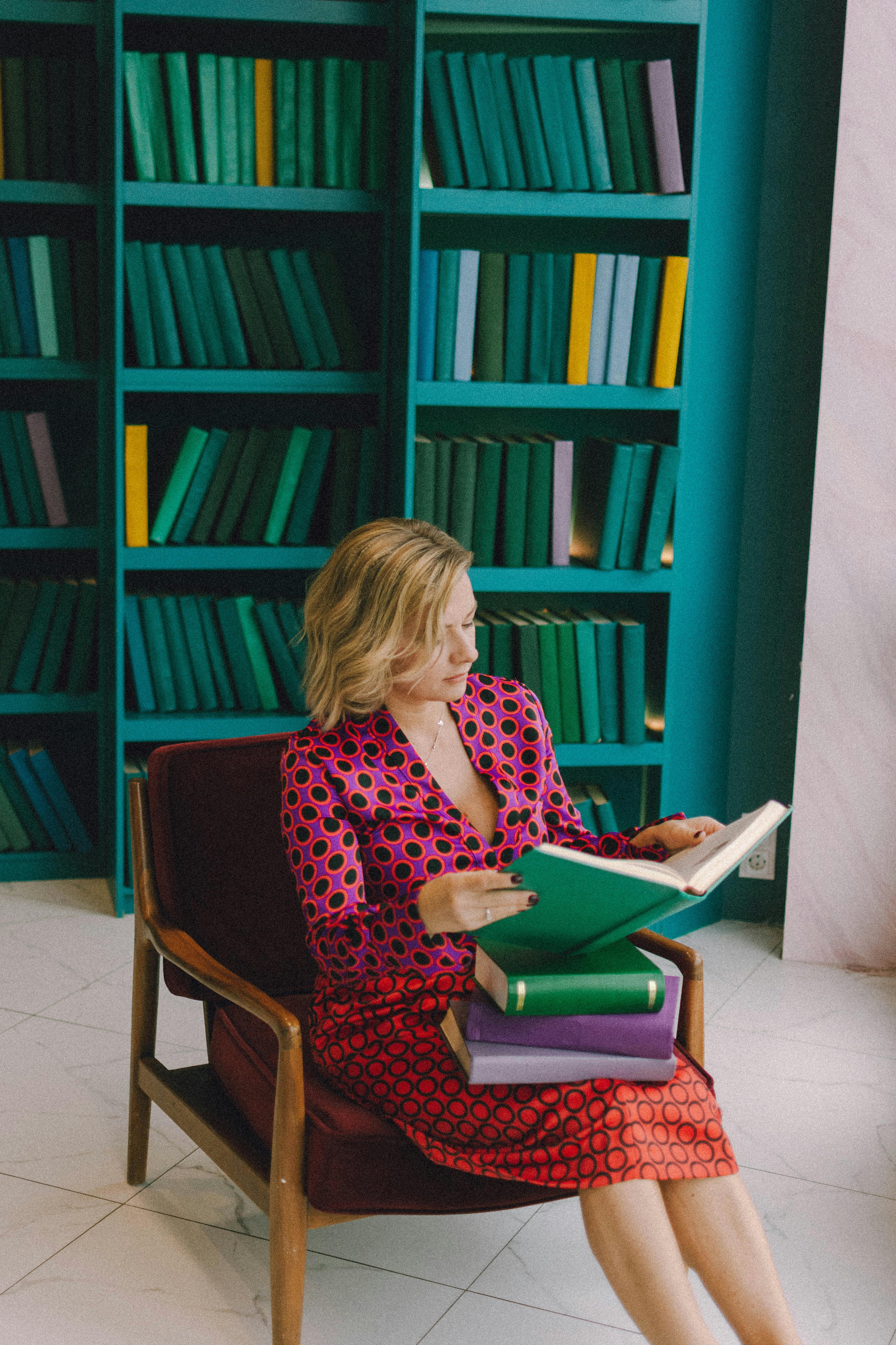 Woman Reading in Library · Free Stock Photo