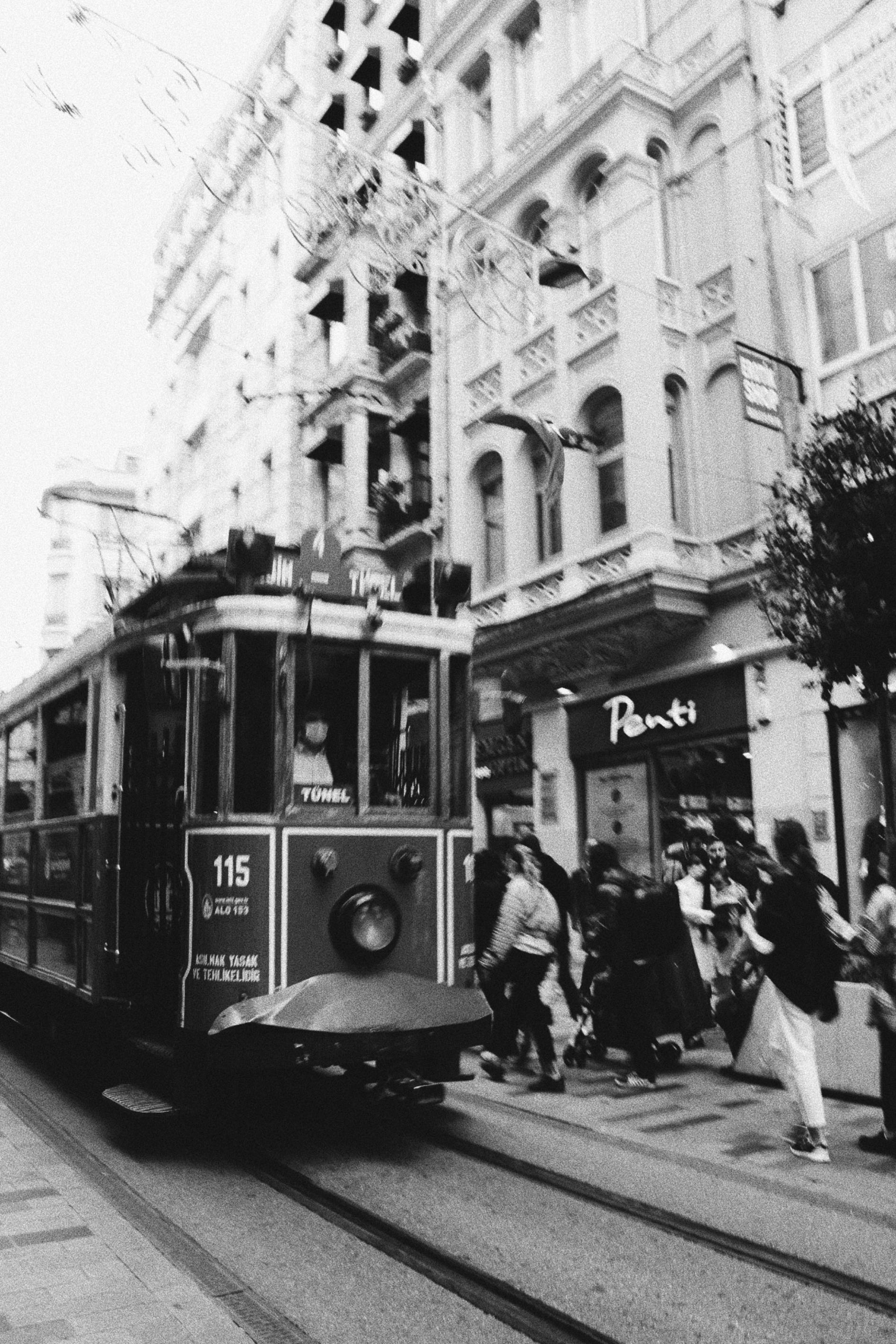 Person Riding Vehicle Grayscale Photo · Free Stock Photo