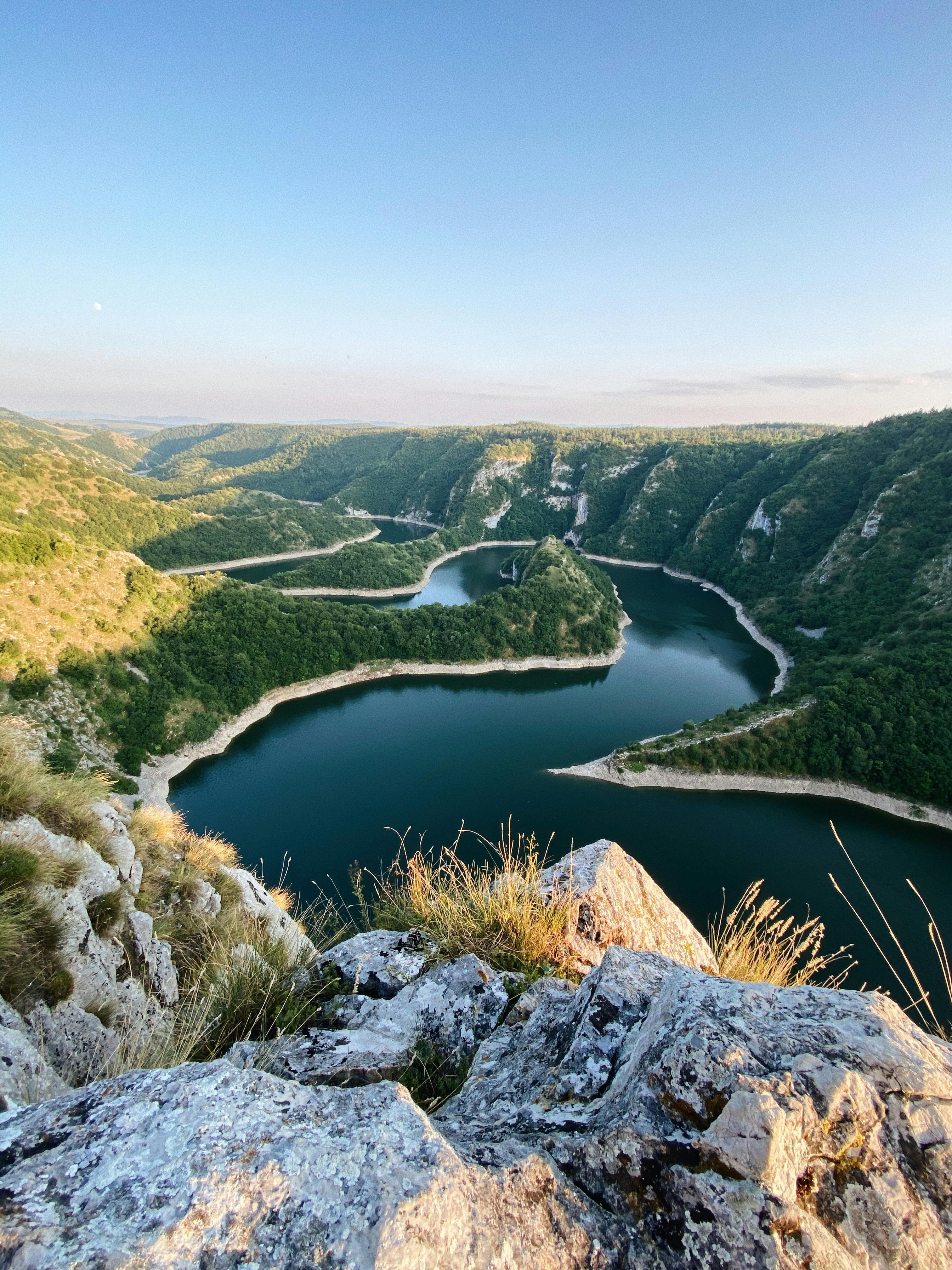 River Between Hills · Free Stock Photo