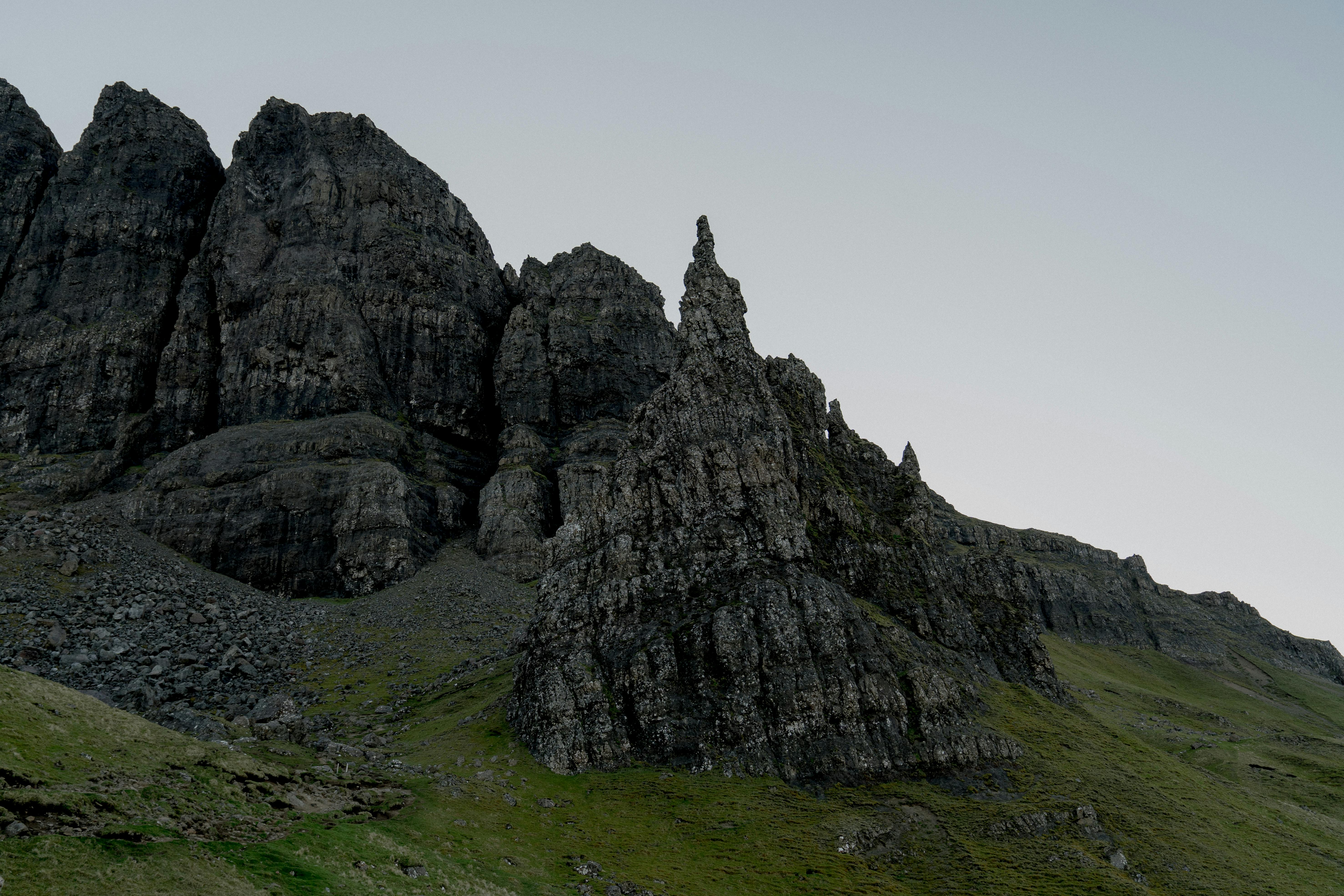 Gray Rocky Mountains Under the Gray Sky · Free Stock Photo