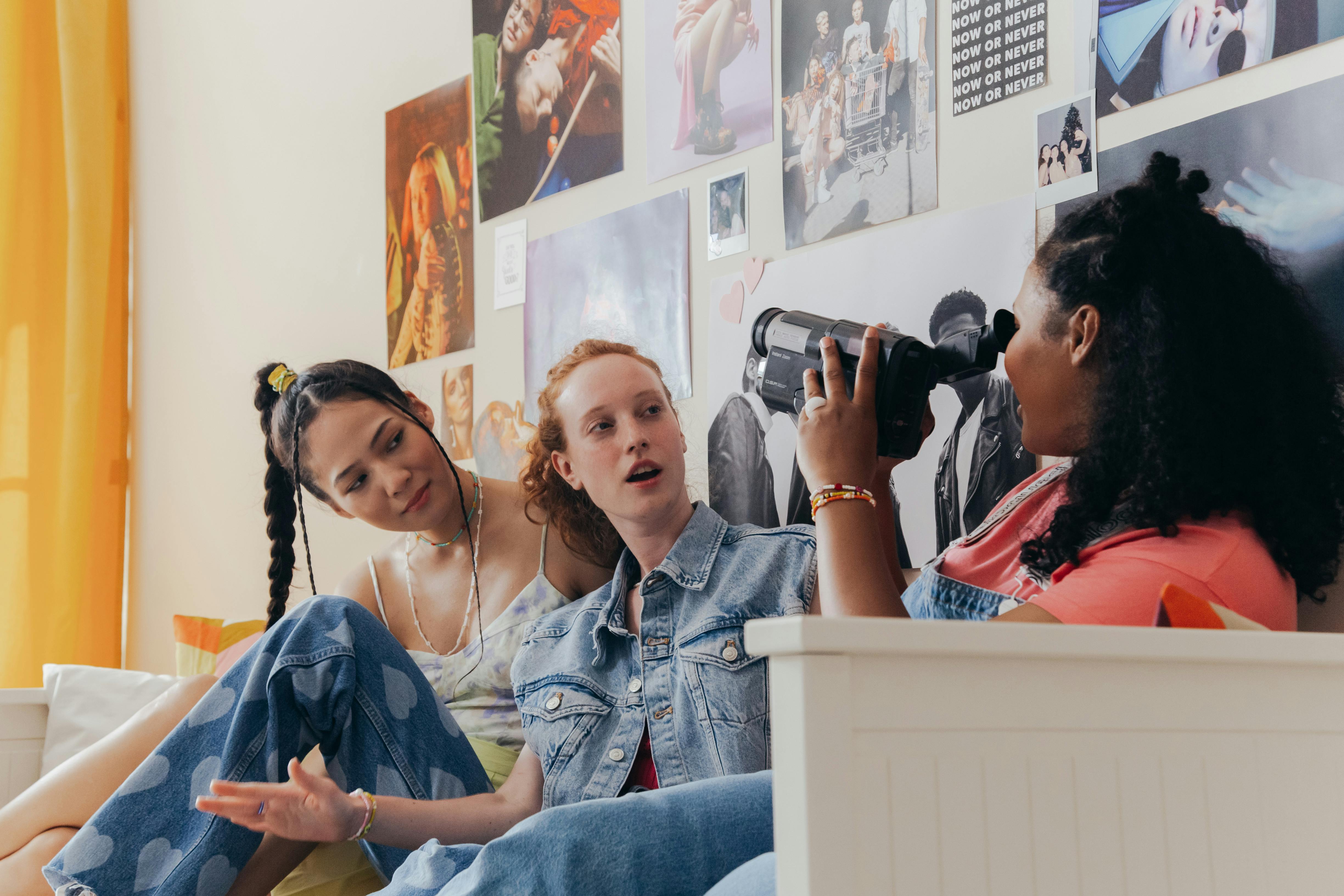 Three Women Sitting on the Sofa · Free Stock Photo