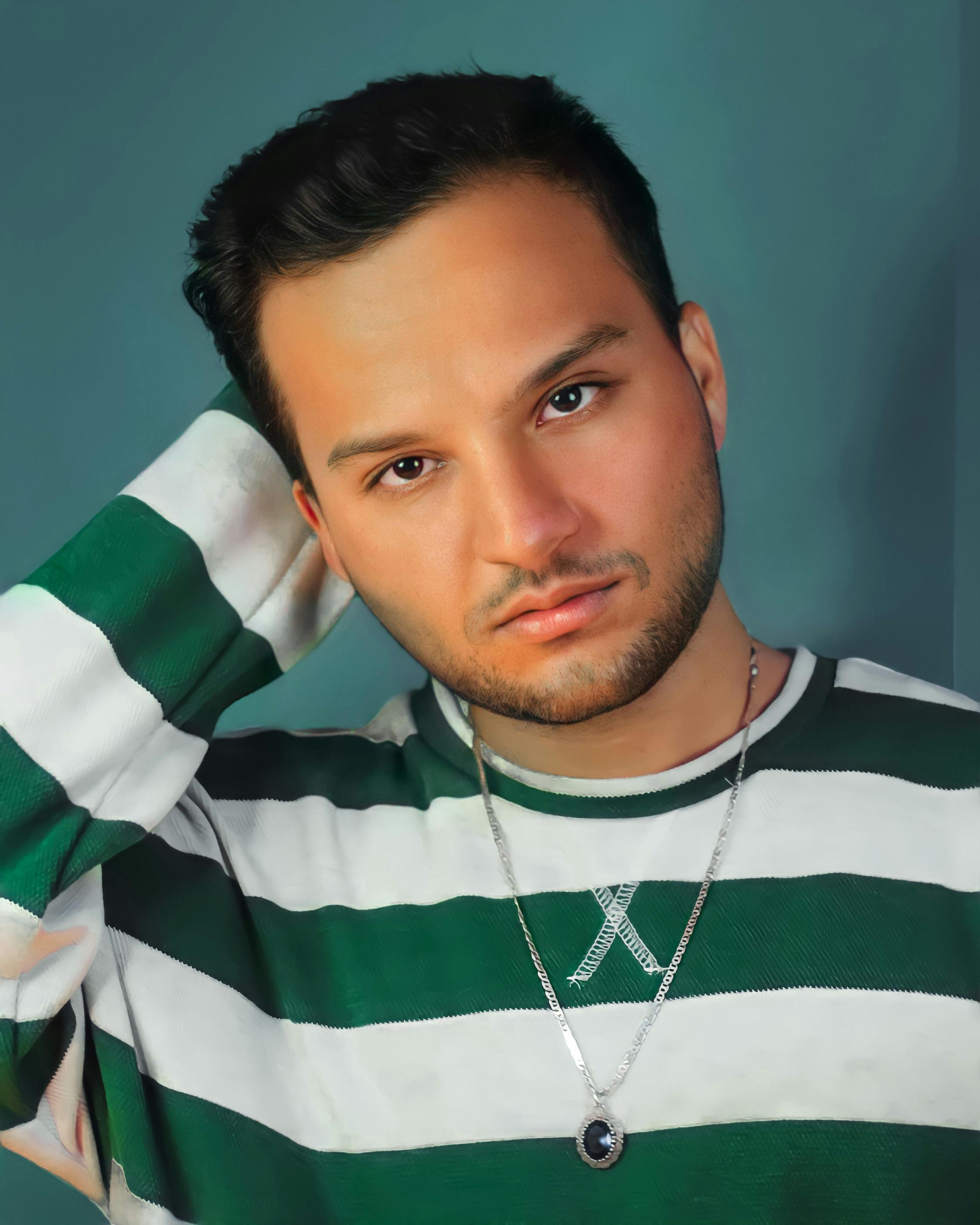 Portrait of a Shirtless Strongman Handling Wooden Blocks · Free Stock Photo