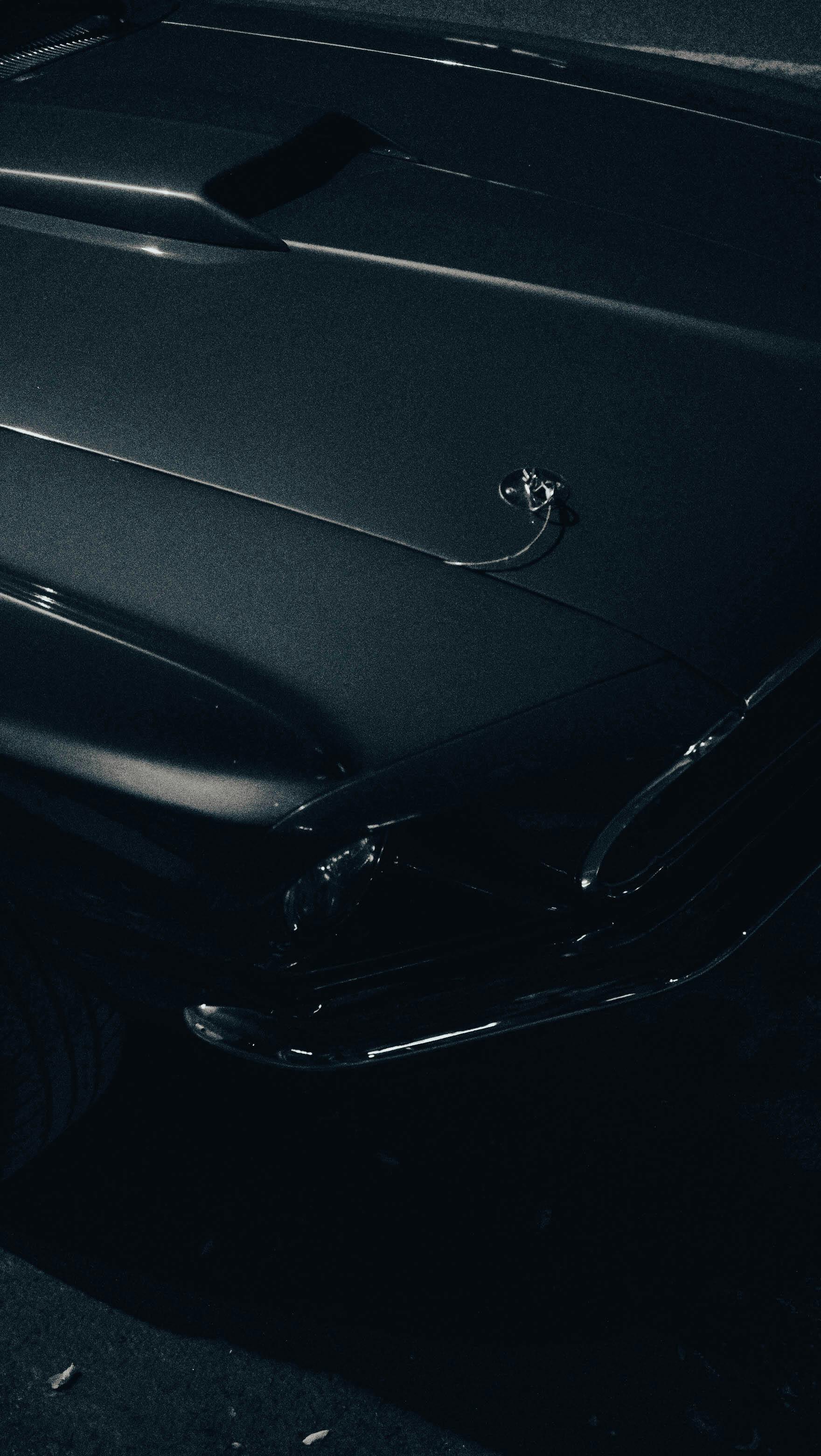 A Close-up Shot of a Black Car · Free Stock Photo
