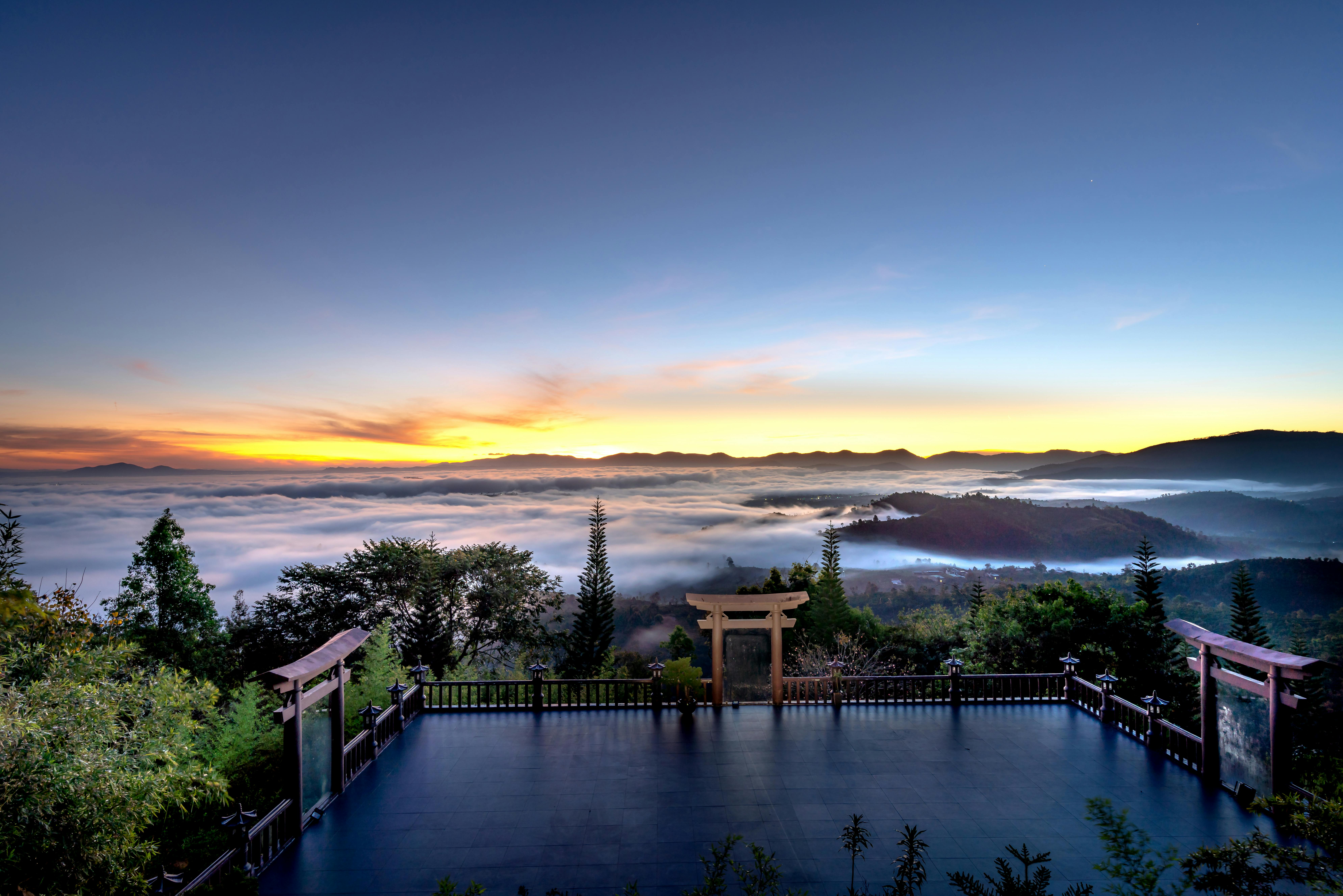Clouds behind Temple Courtyard at Sunset · Free Stock Photo