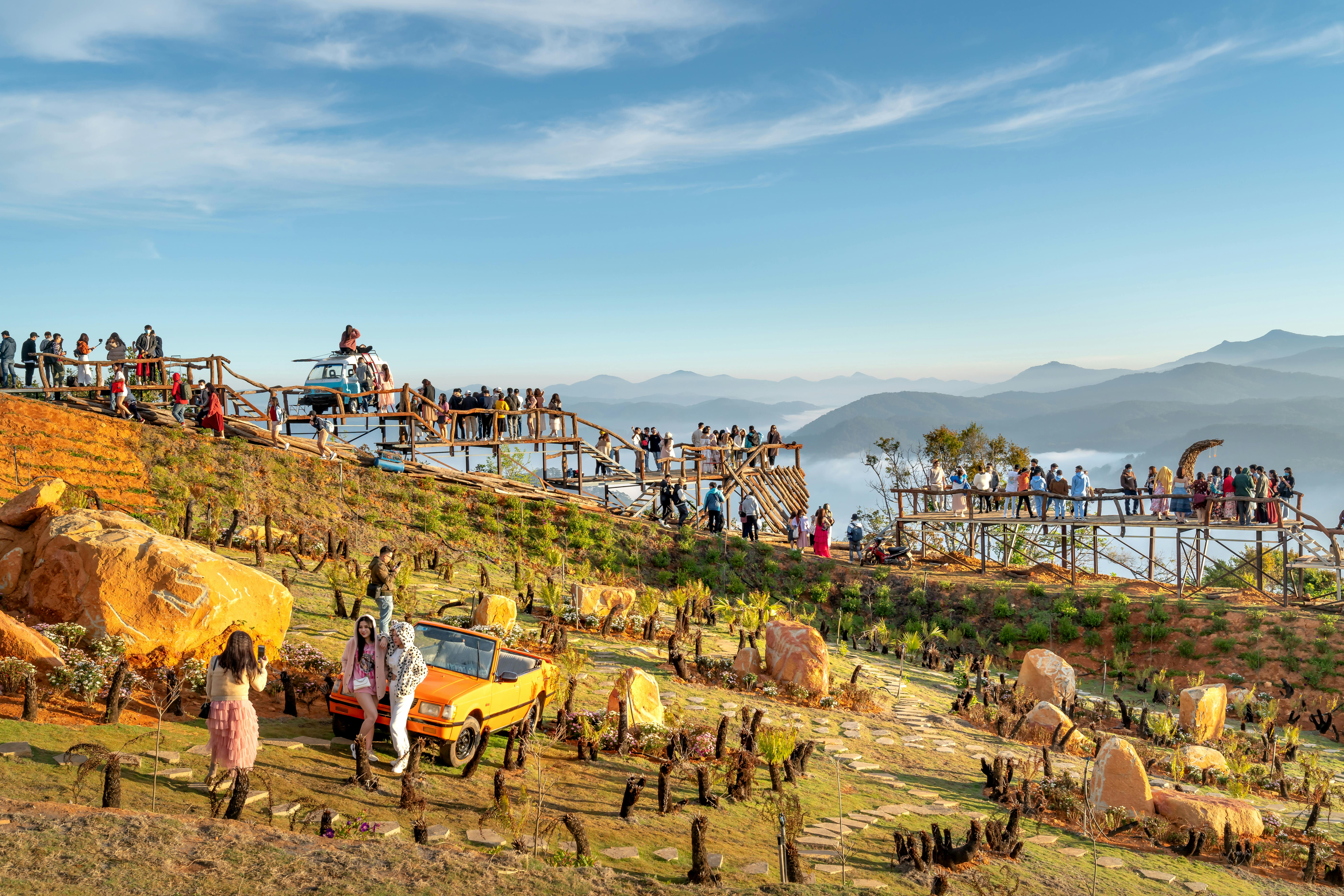 Tourists Sightseeing on Hill Top Under Blue Sky · Free Stock Photo