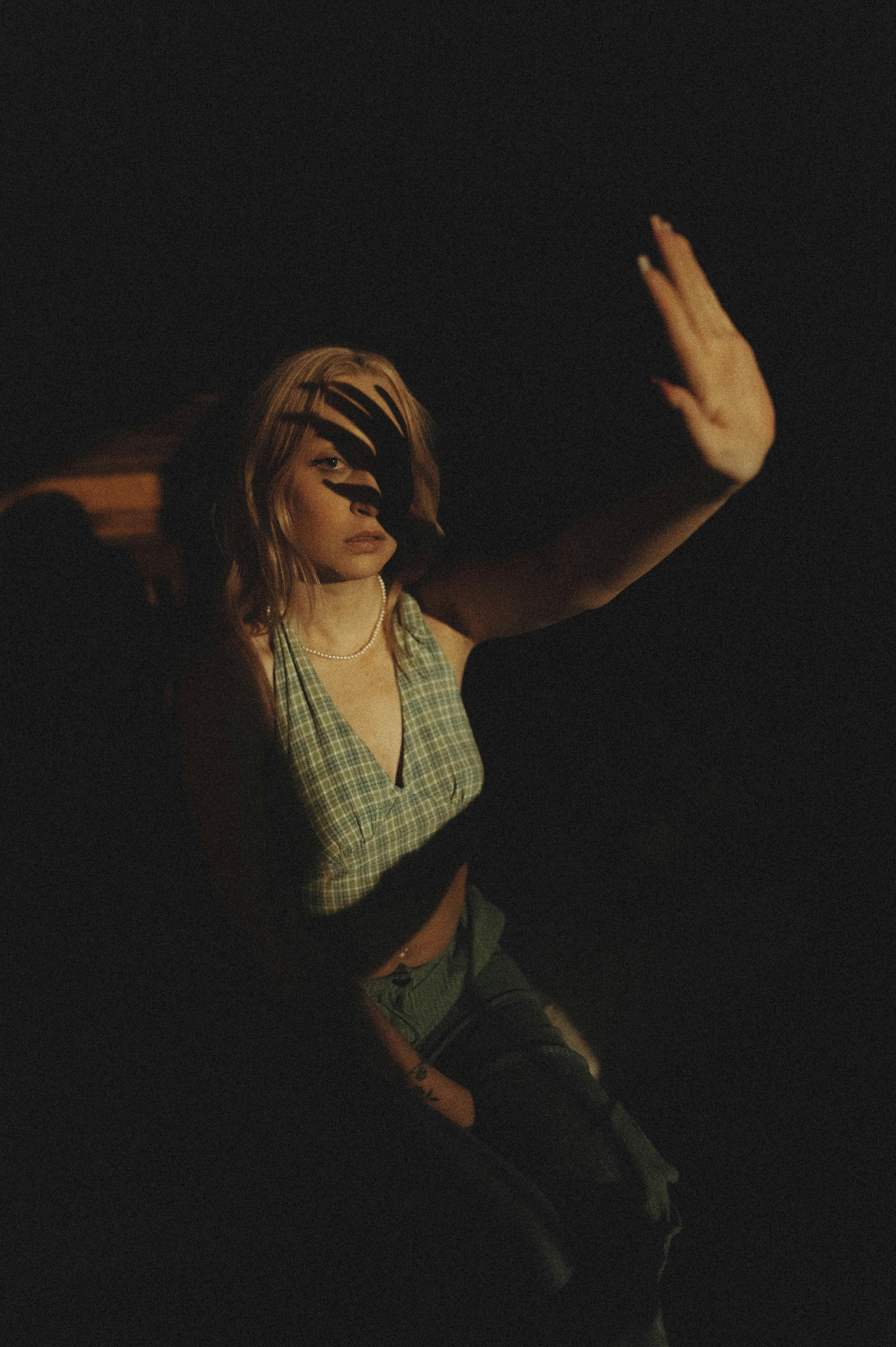 A Woman Screaming with Red Powder on Her Face · Free Stock Photo