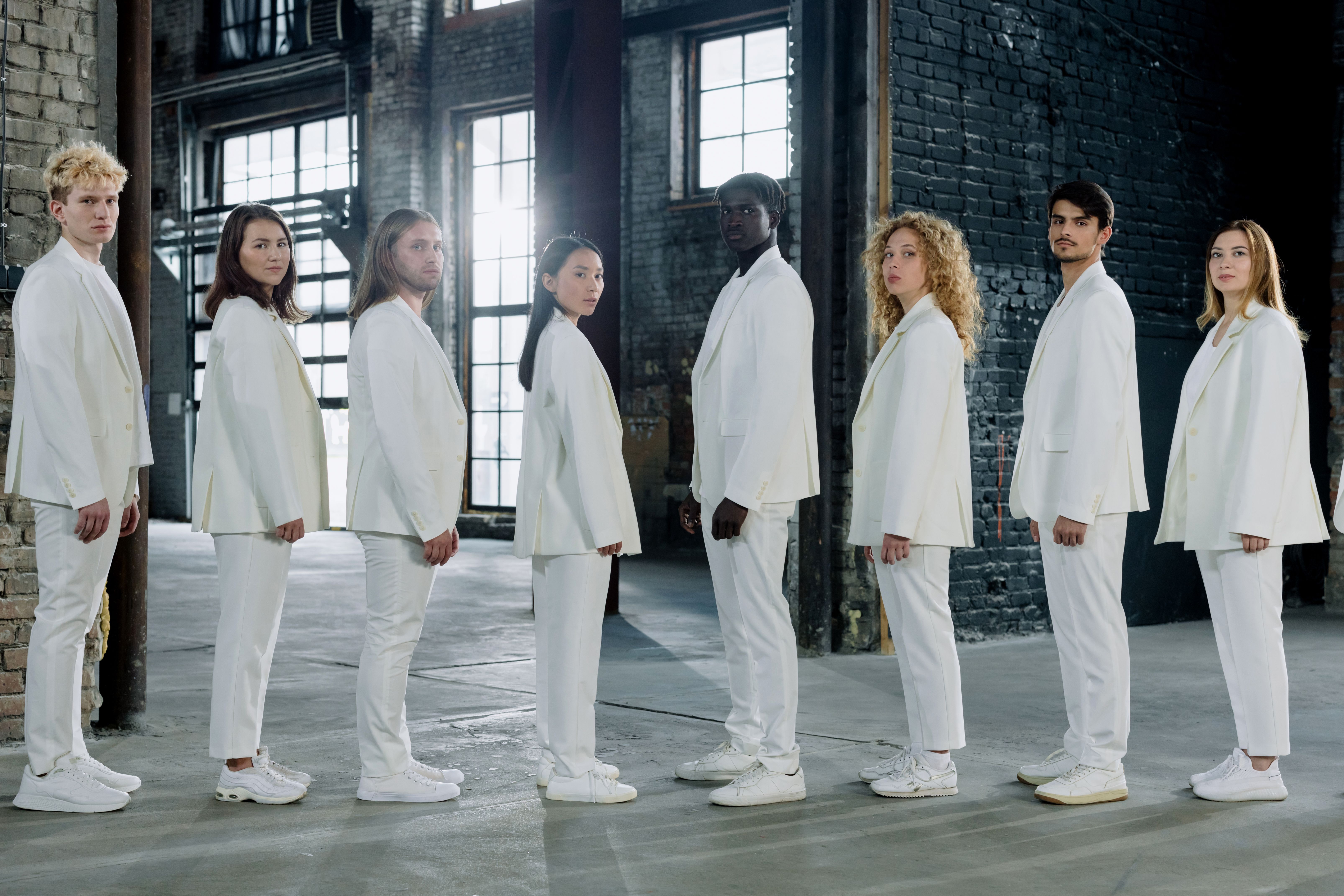 A Group of People Wearing White Clothes · Free Stock Photo