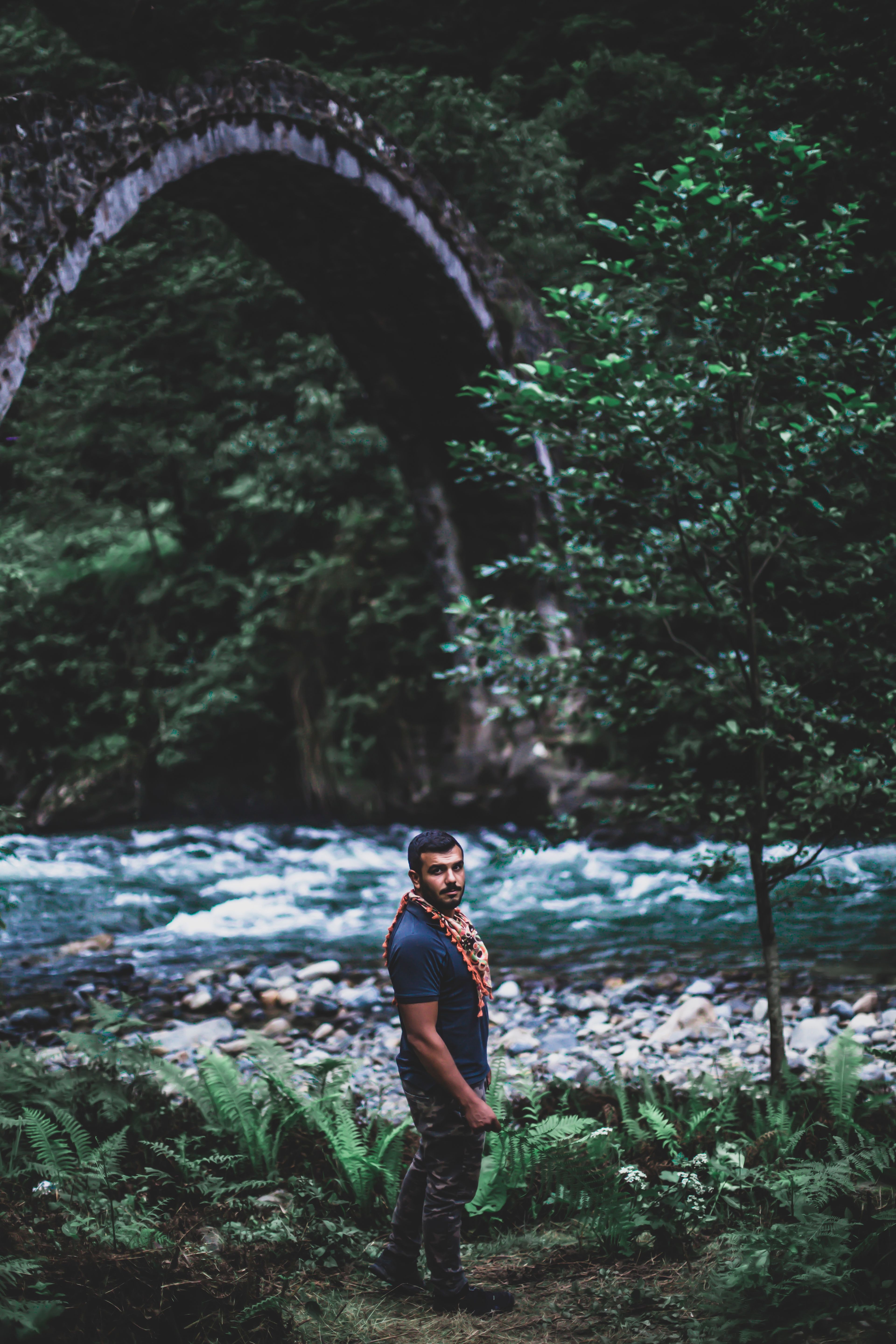 Man standing on Riverside · Free Stock Photo