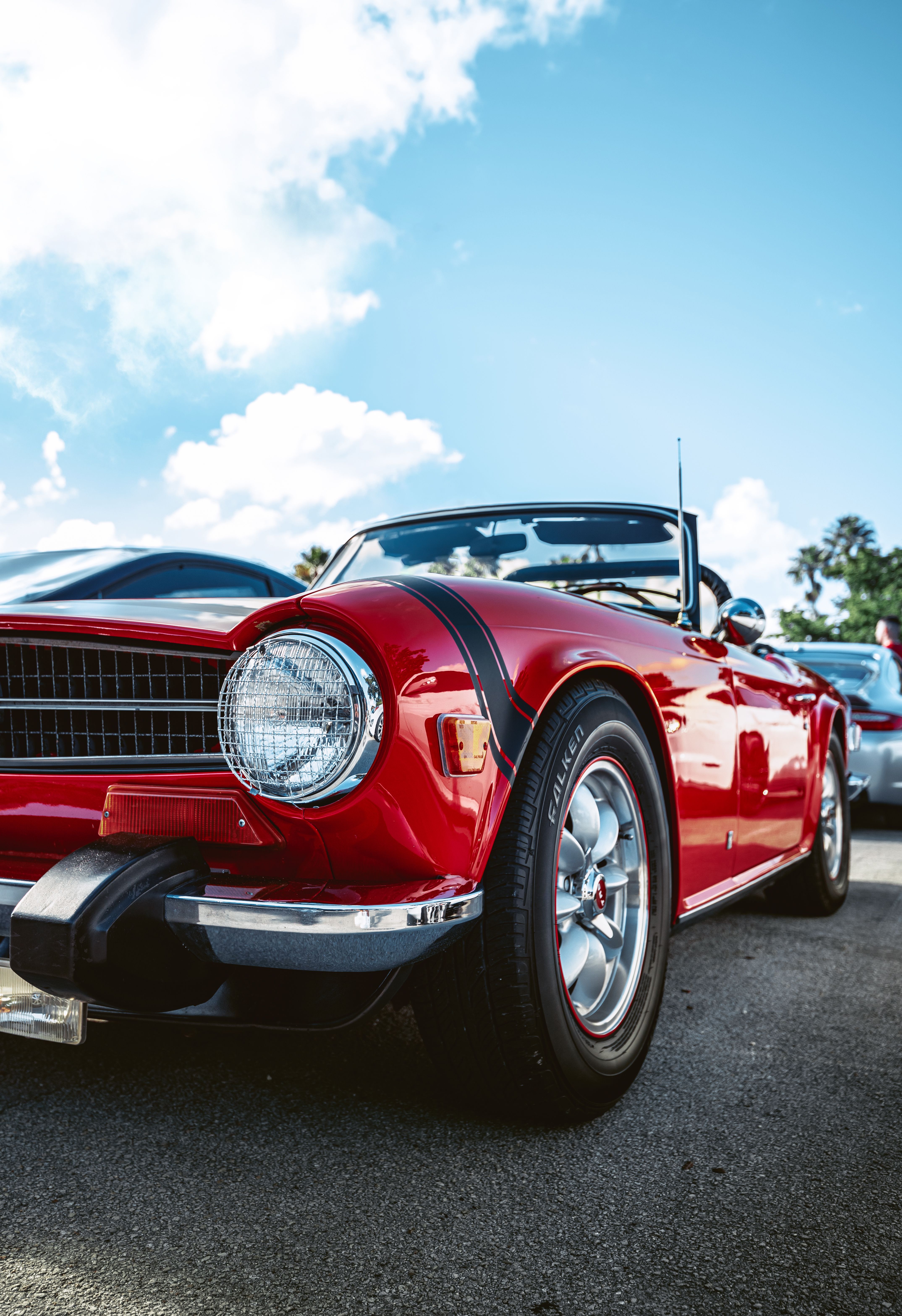 A Red Car Parked on the Road · Free Stock Photo