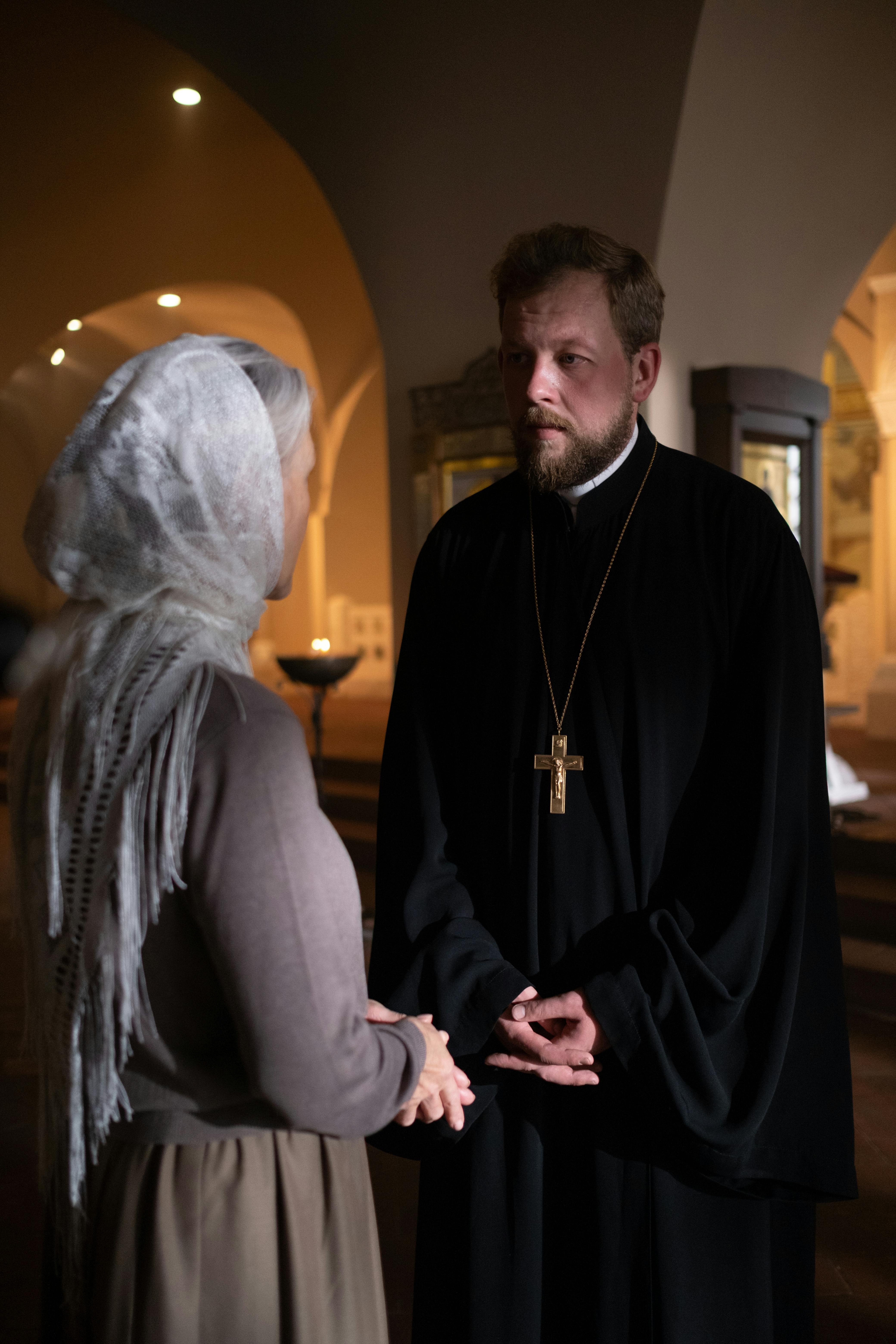 Parishioner talking to a Priest · Free Stock Photo
