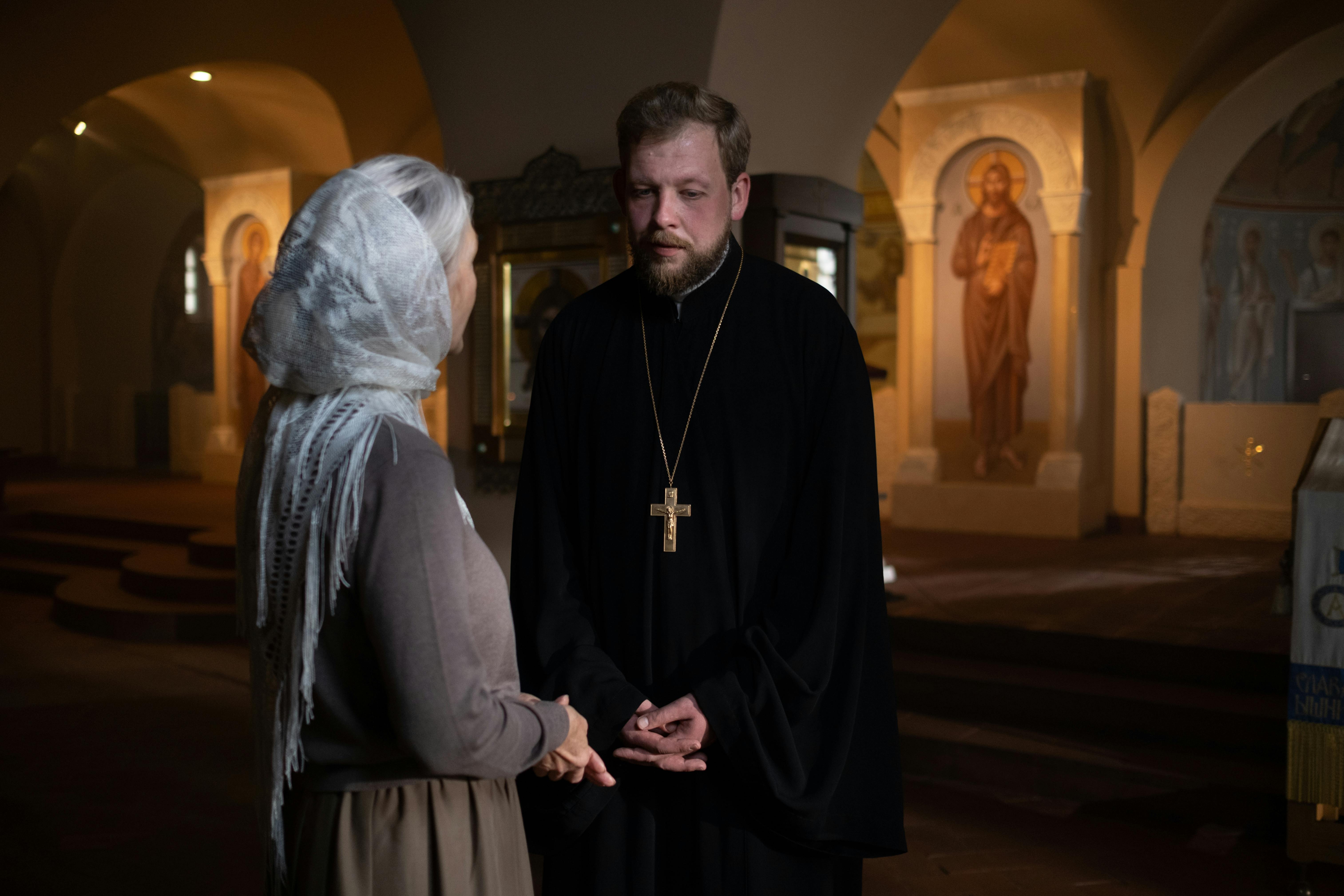 Priest talking to a Parishioner · Free Stock Photo