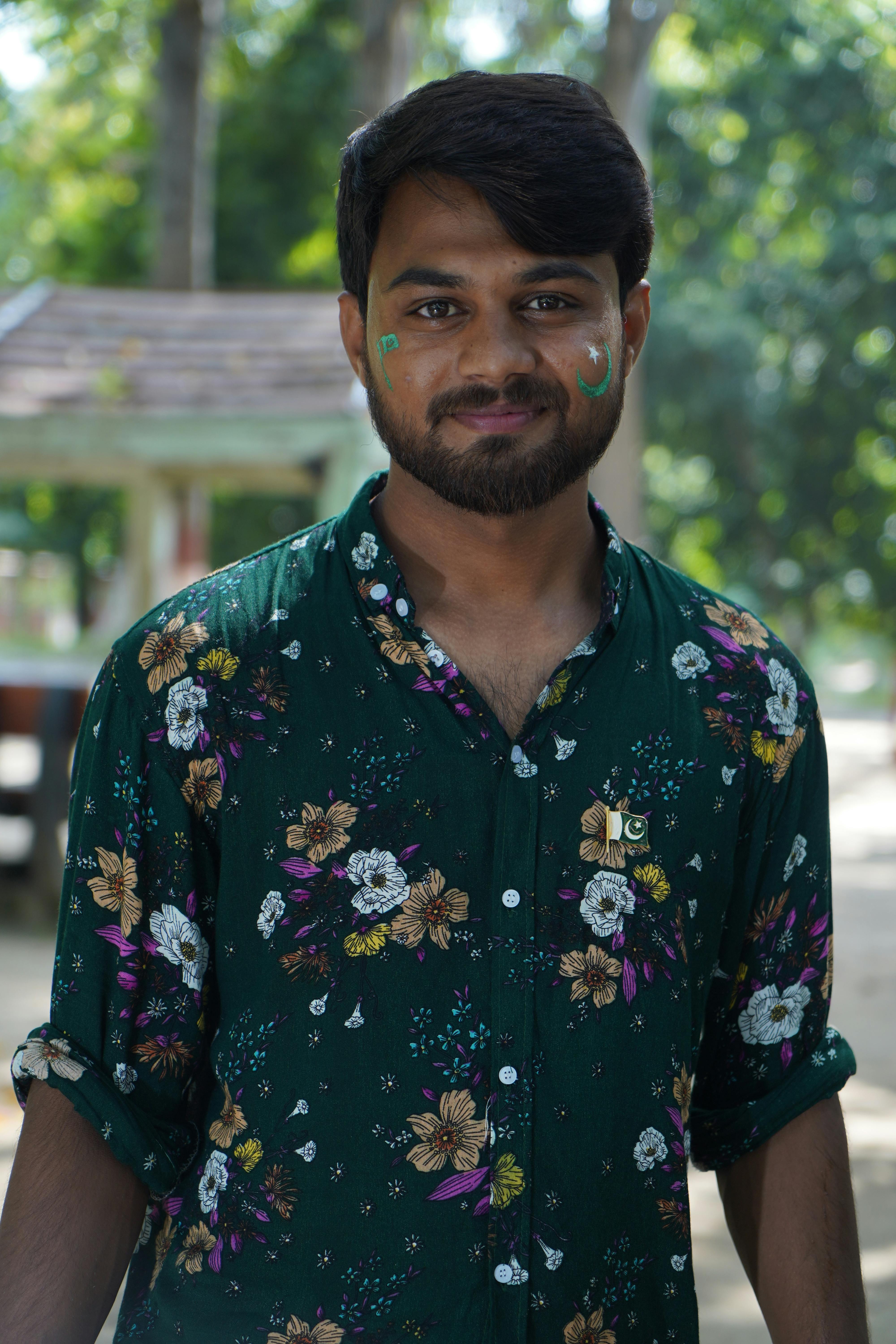 Man in Yellow Shirt Dress Standing Beside Man in Red Shirt Dress · Free ...