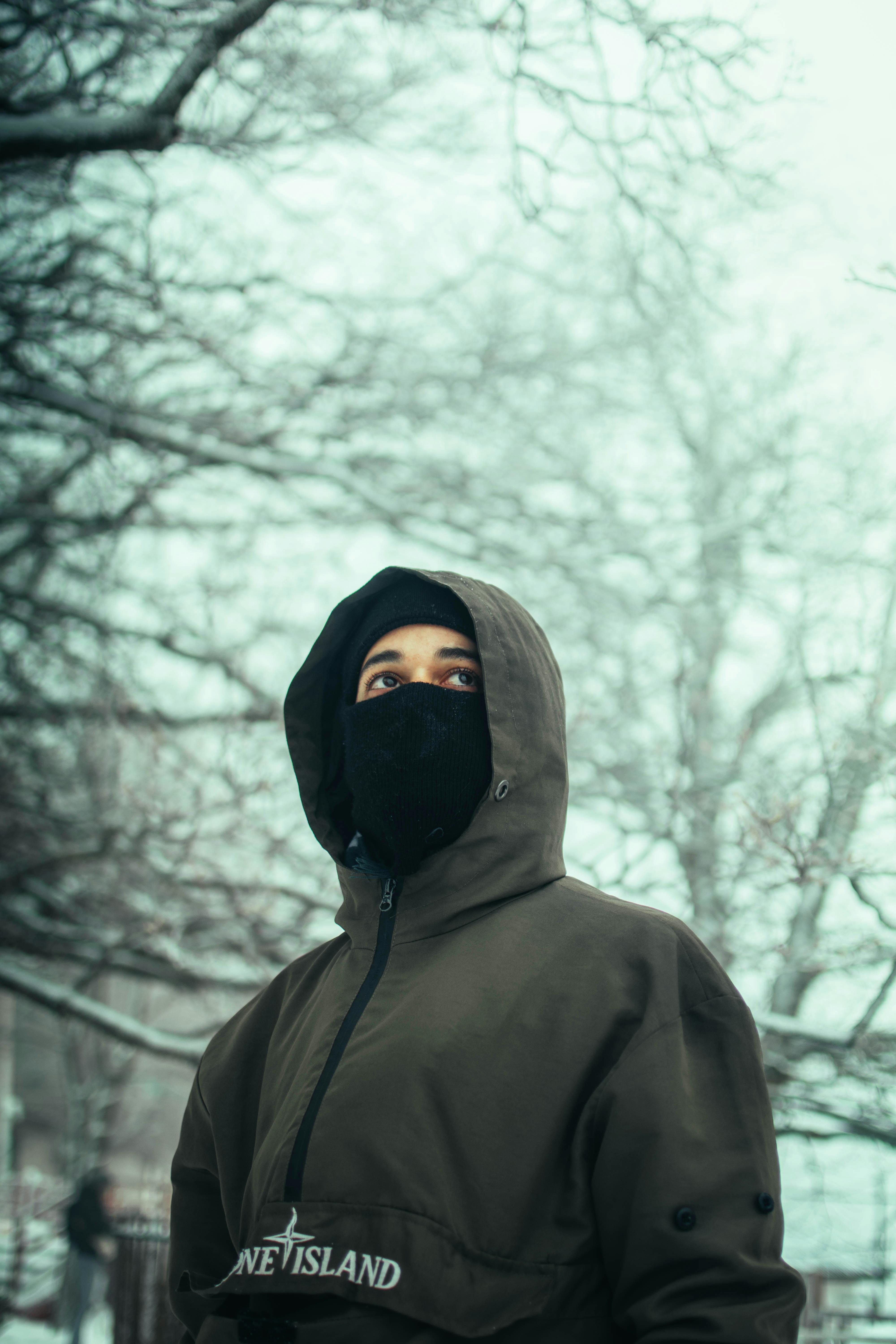 Person in Leather Jacket Wear a Balaclava · Free Stock Photo