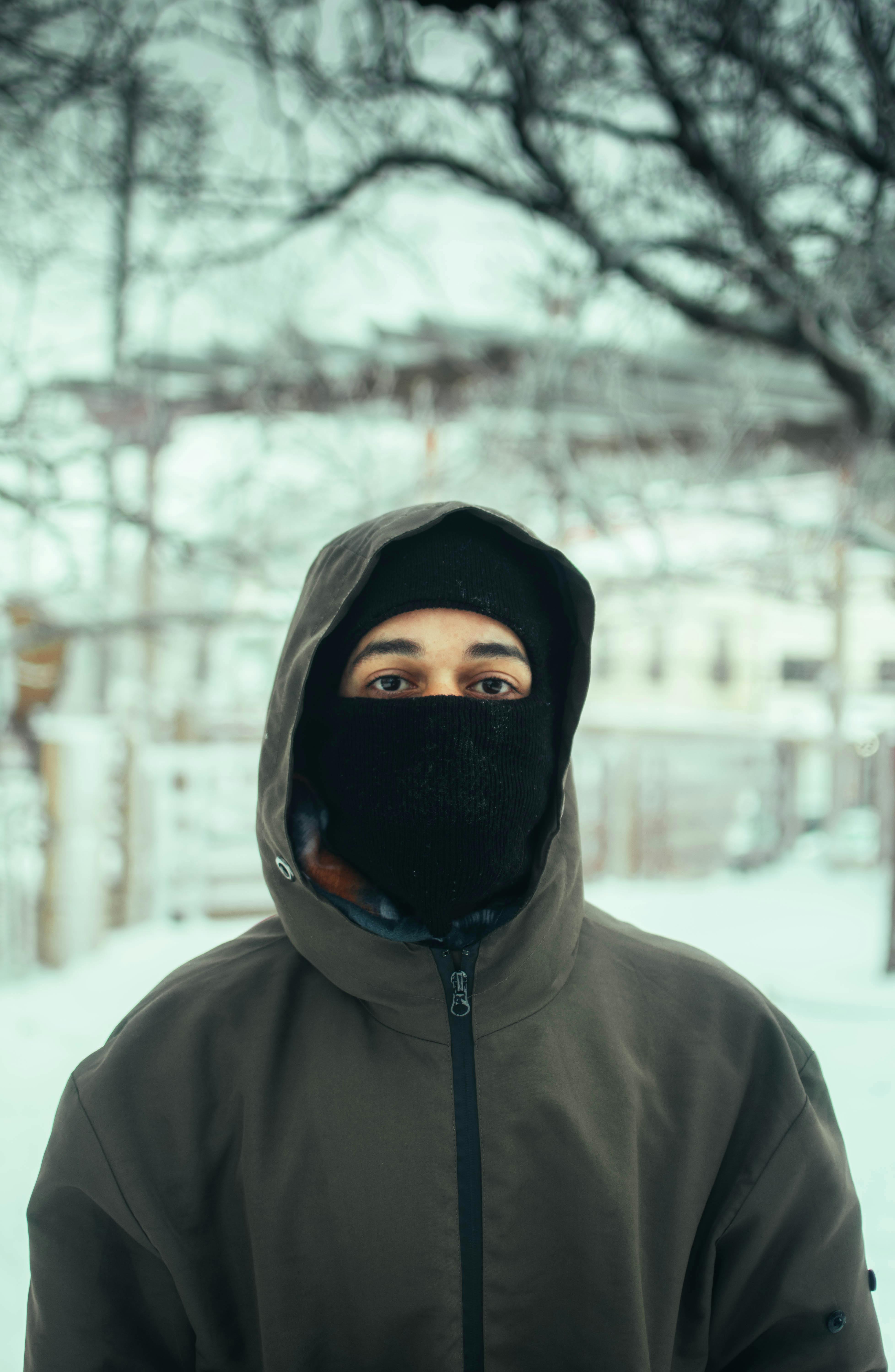 Man wearing Jacket and Black Face Mask · Free Stock Photo