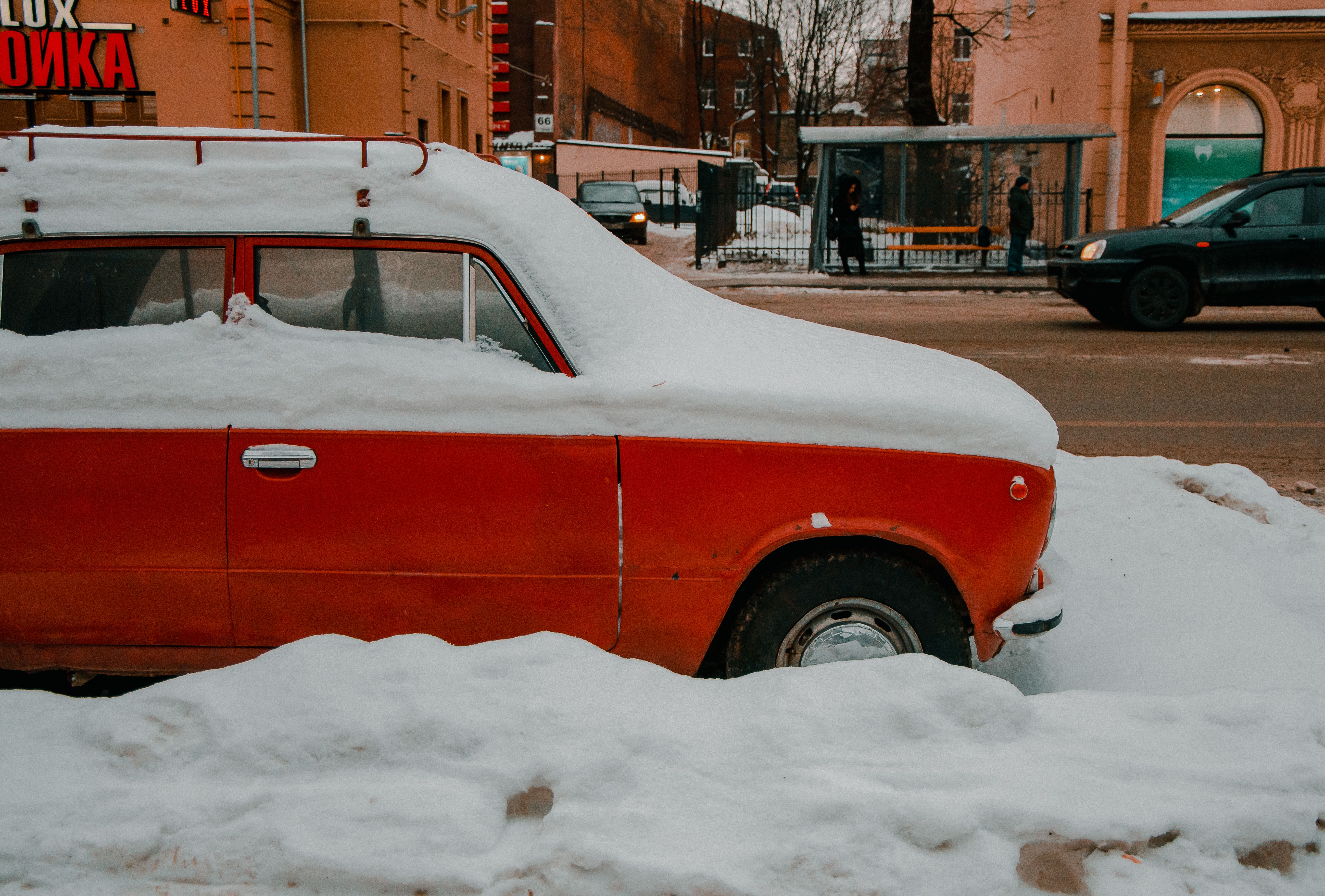 Blue Sedan on Snow at Daytime · Free Stock Photo
