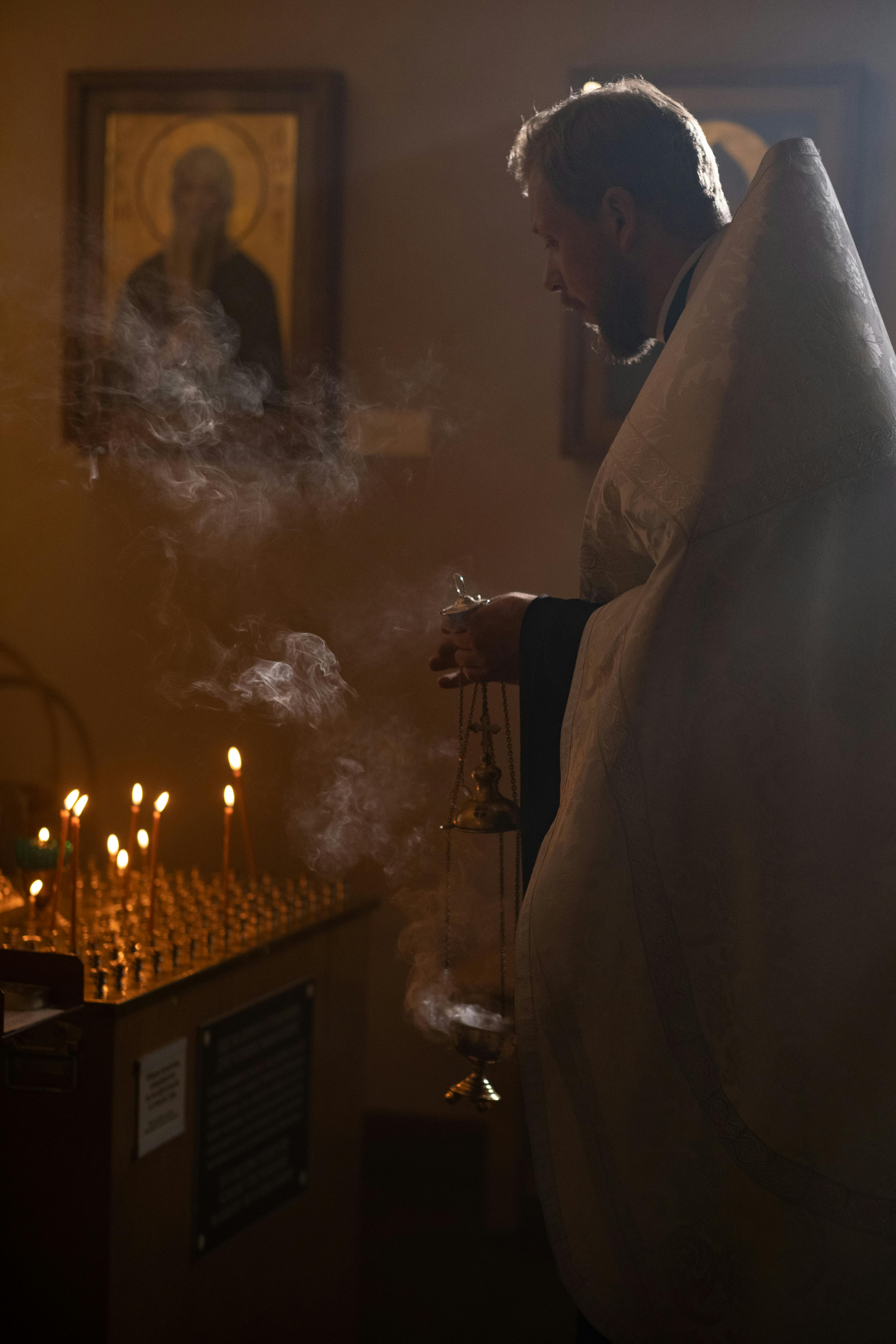 Orthodox Priest Holding Incense · Free Stock Photo