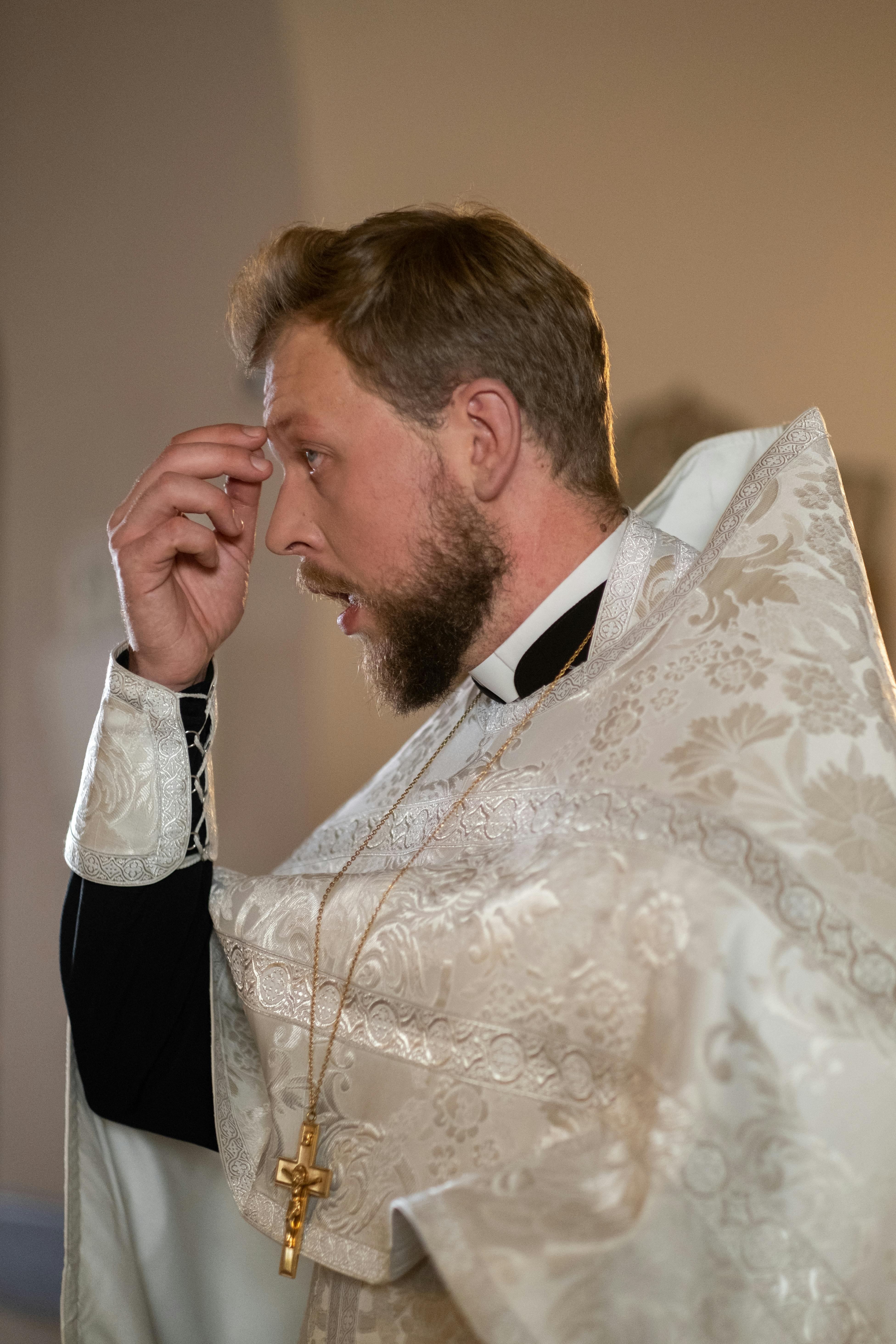 A Priest at an Altar · Free Stock Photo