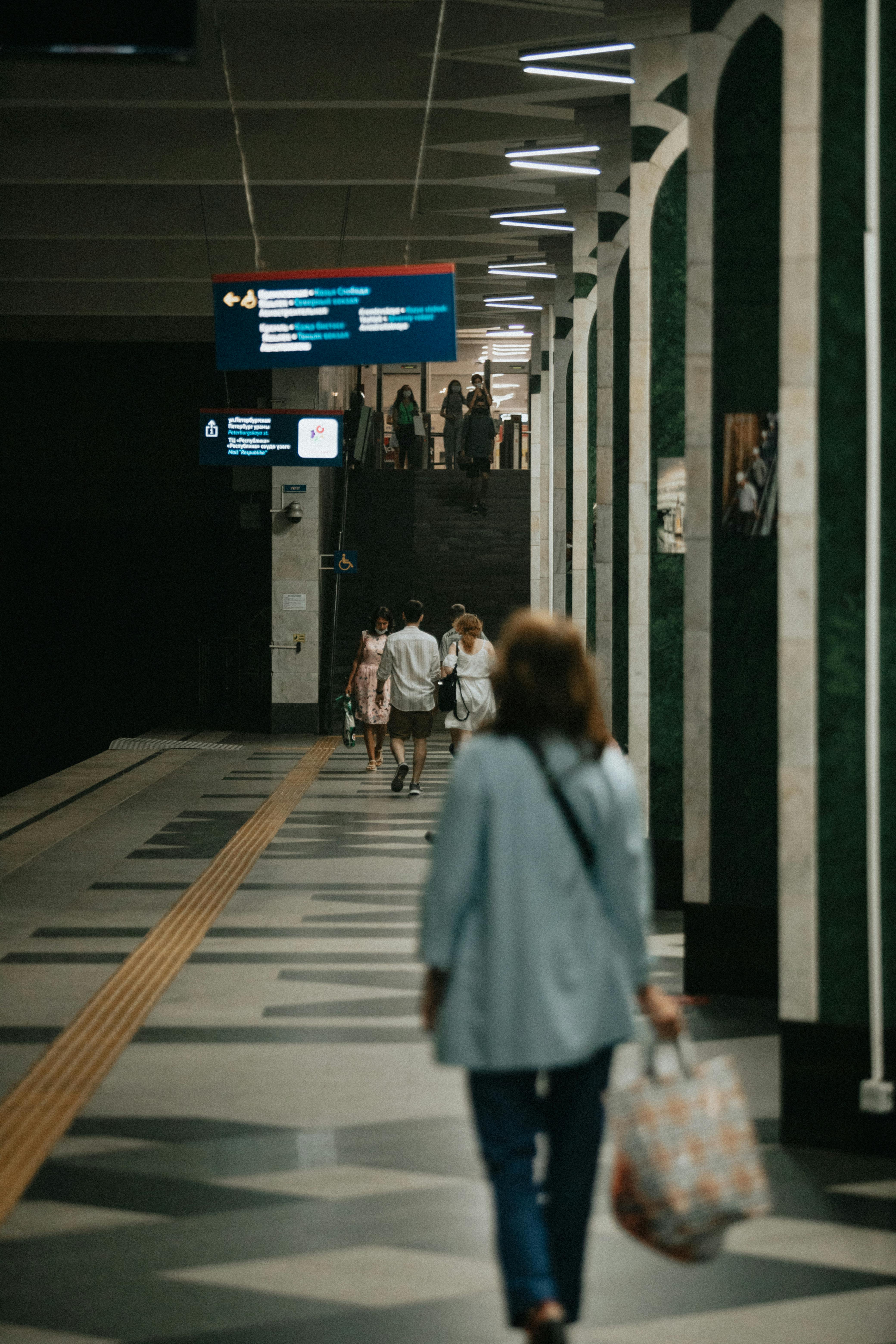 People Walking Inside a Building · Free Stock Photo