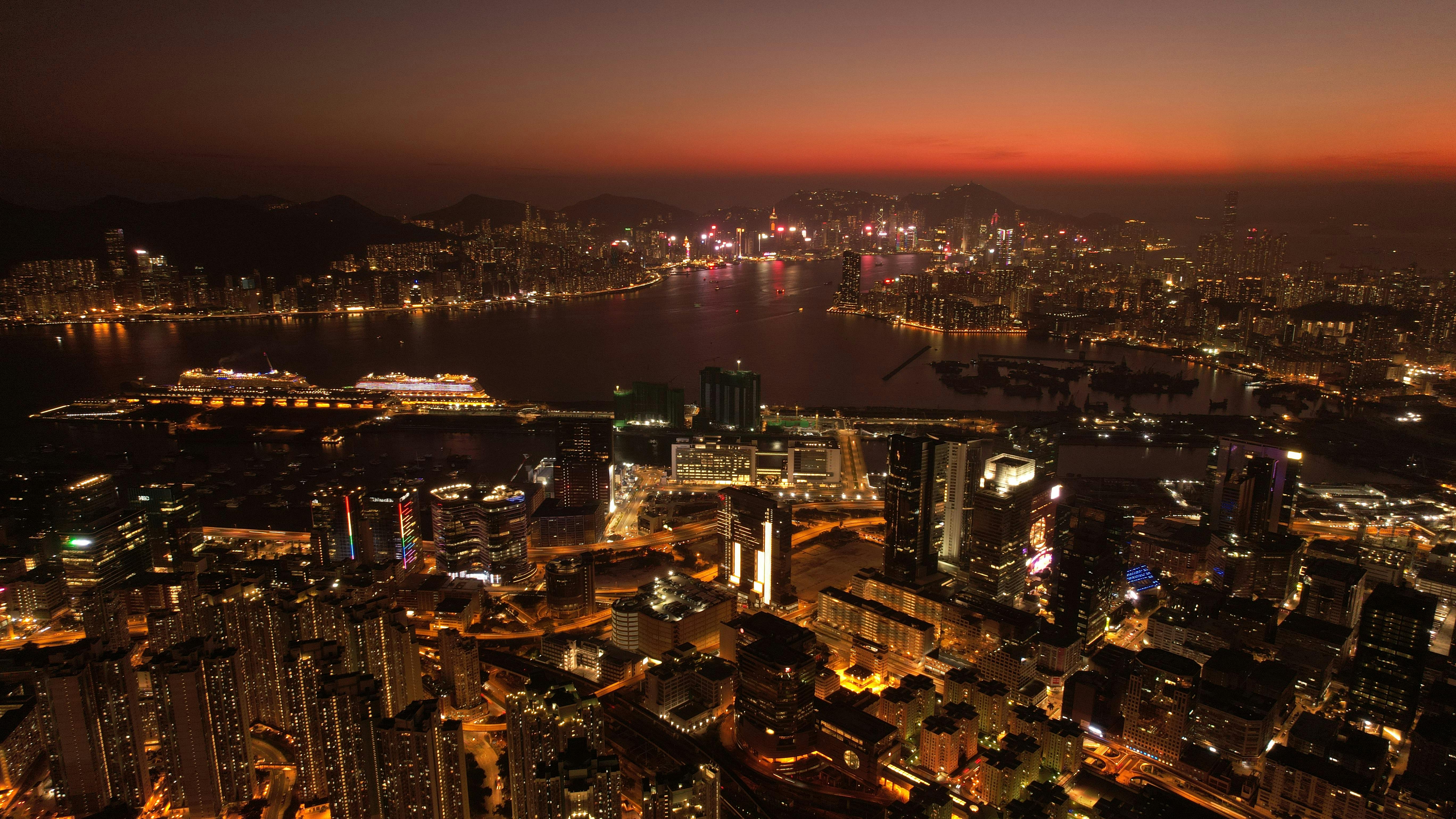 Aerial Shot of City Buildings during Night Time · Free Stock Photo