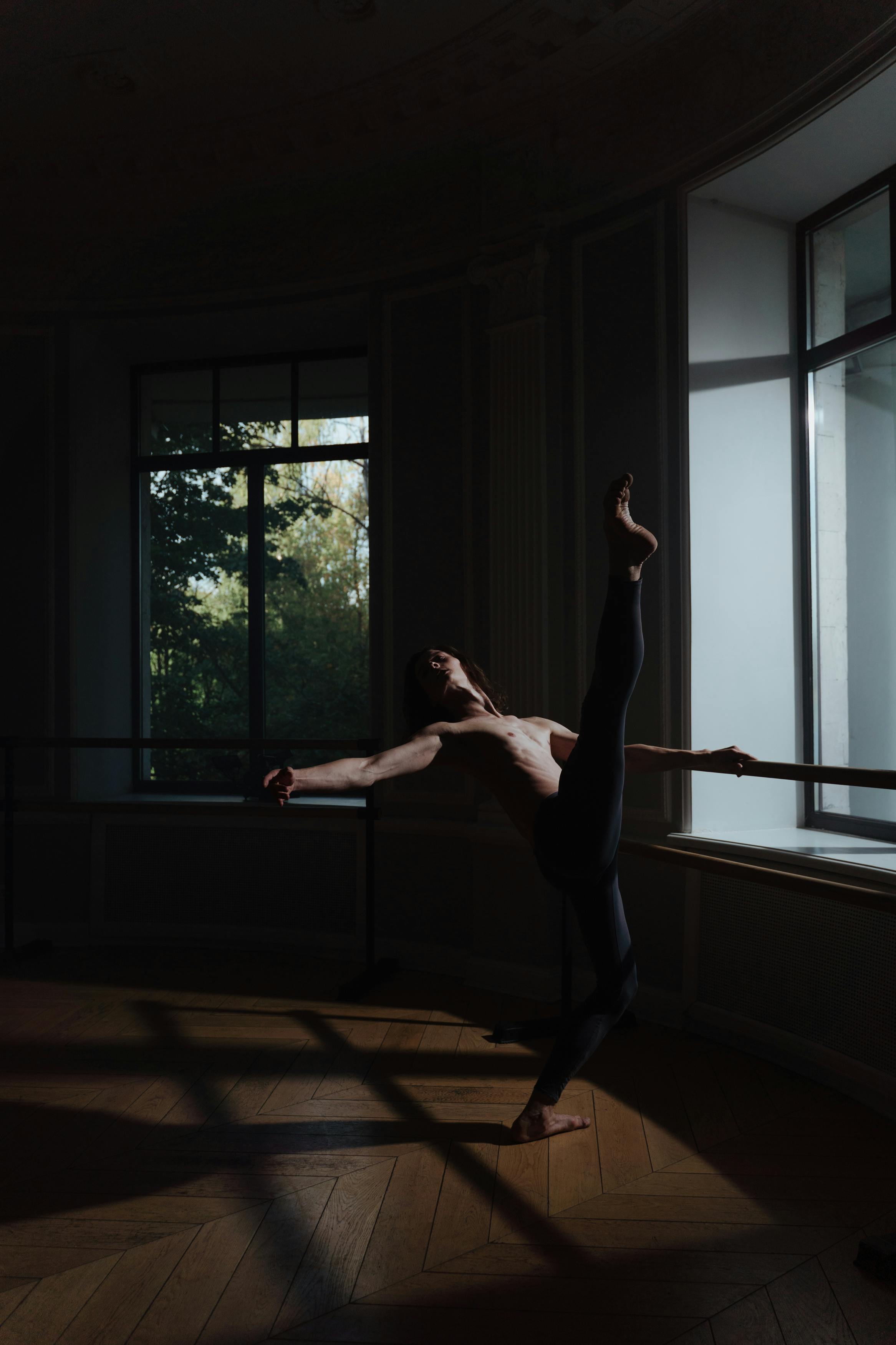 A Shirtless Man Dancing Gracefully · Free Stock Photo