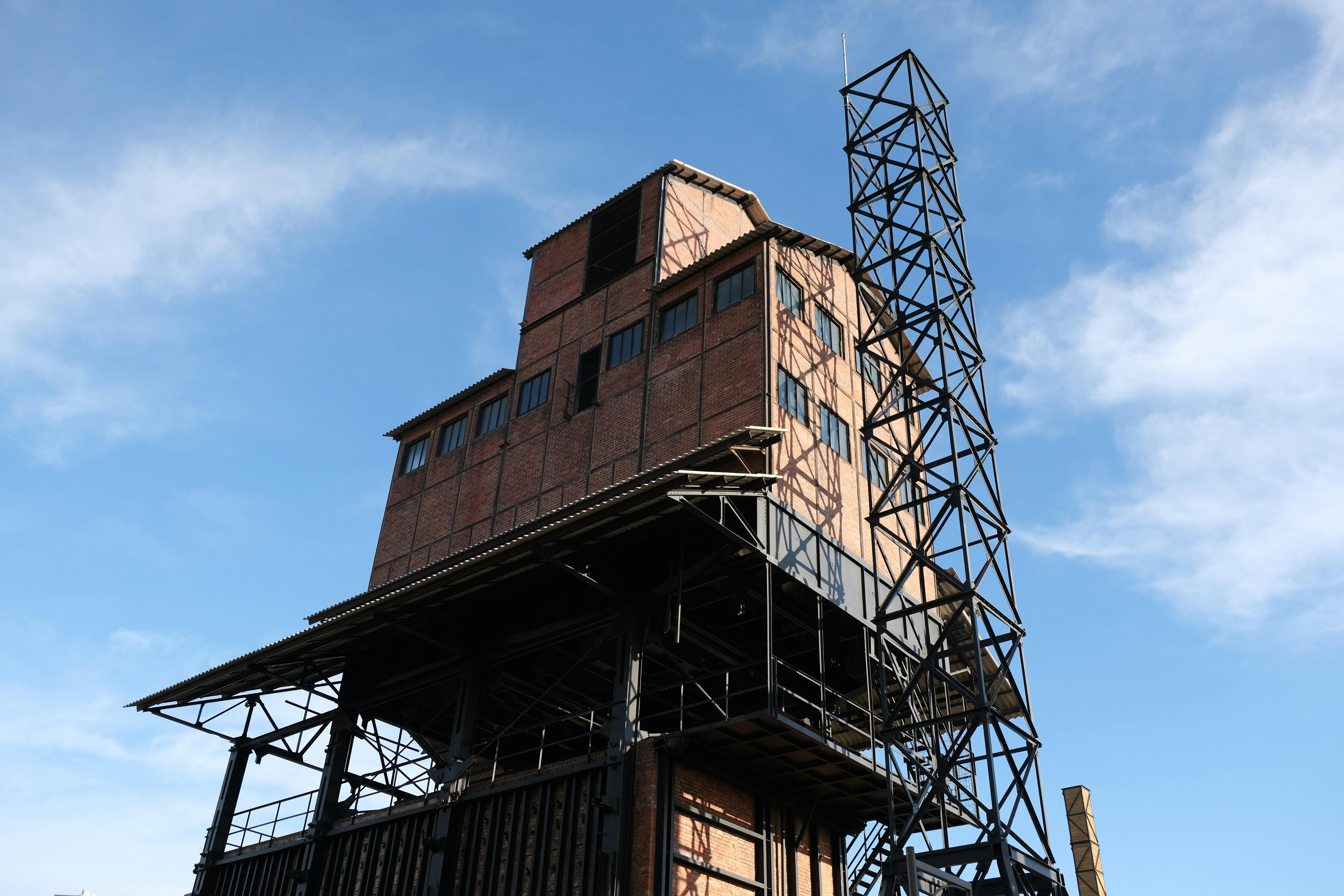 Photo of People on Building Under Construction · Free Stock Photo