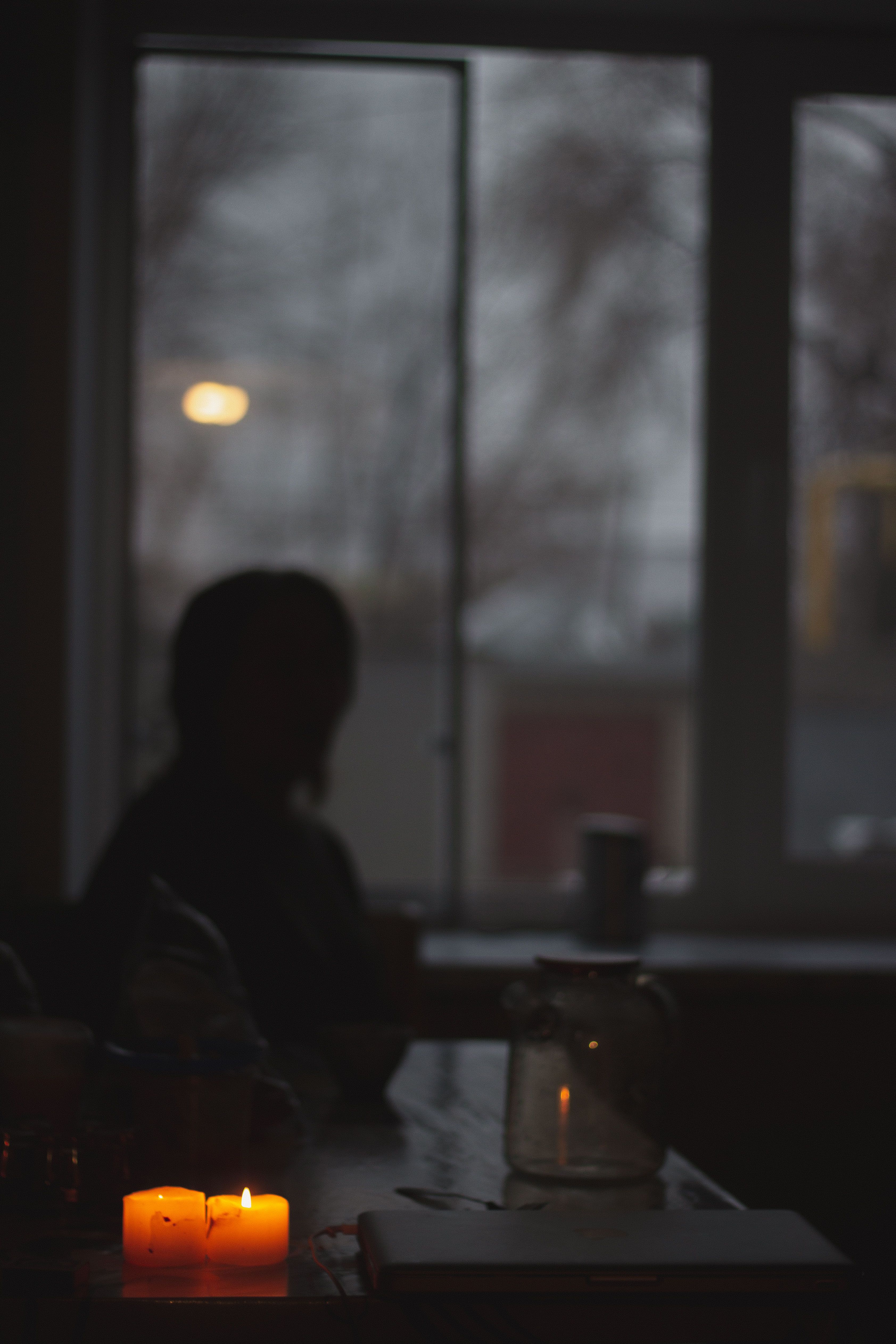 People Lighting Candles From Flame of Big Candle · Free Stock Photo