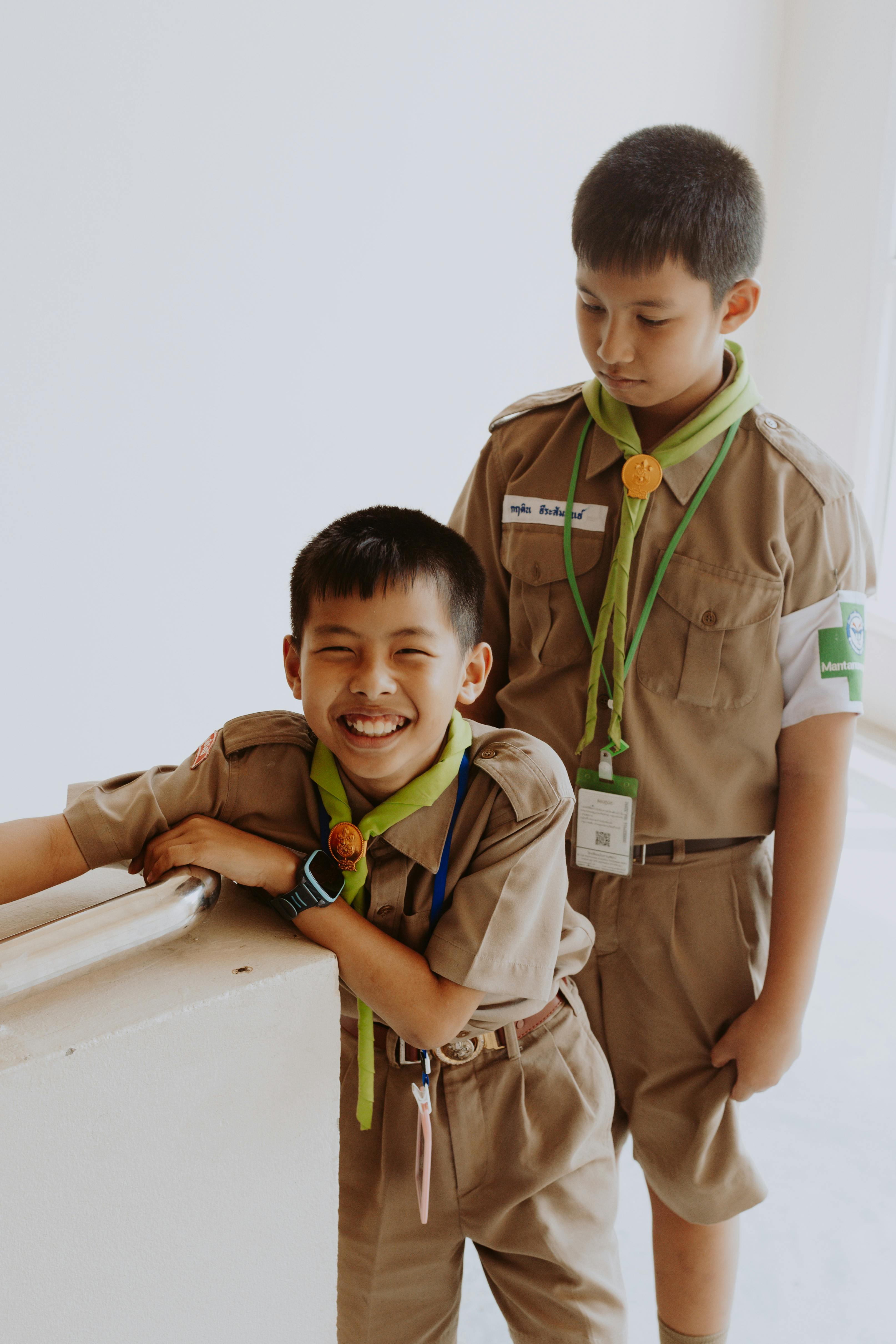 Two Boys Wearing Uniform · Free Stock Photo