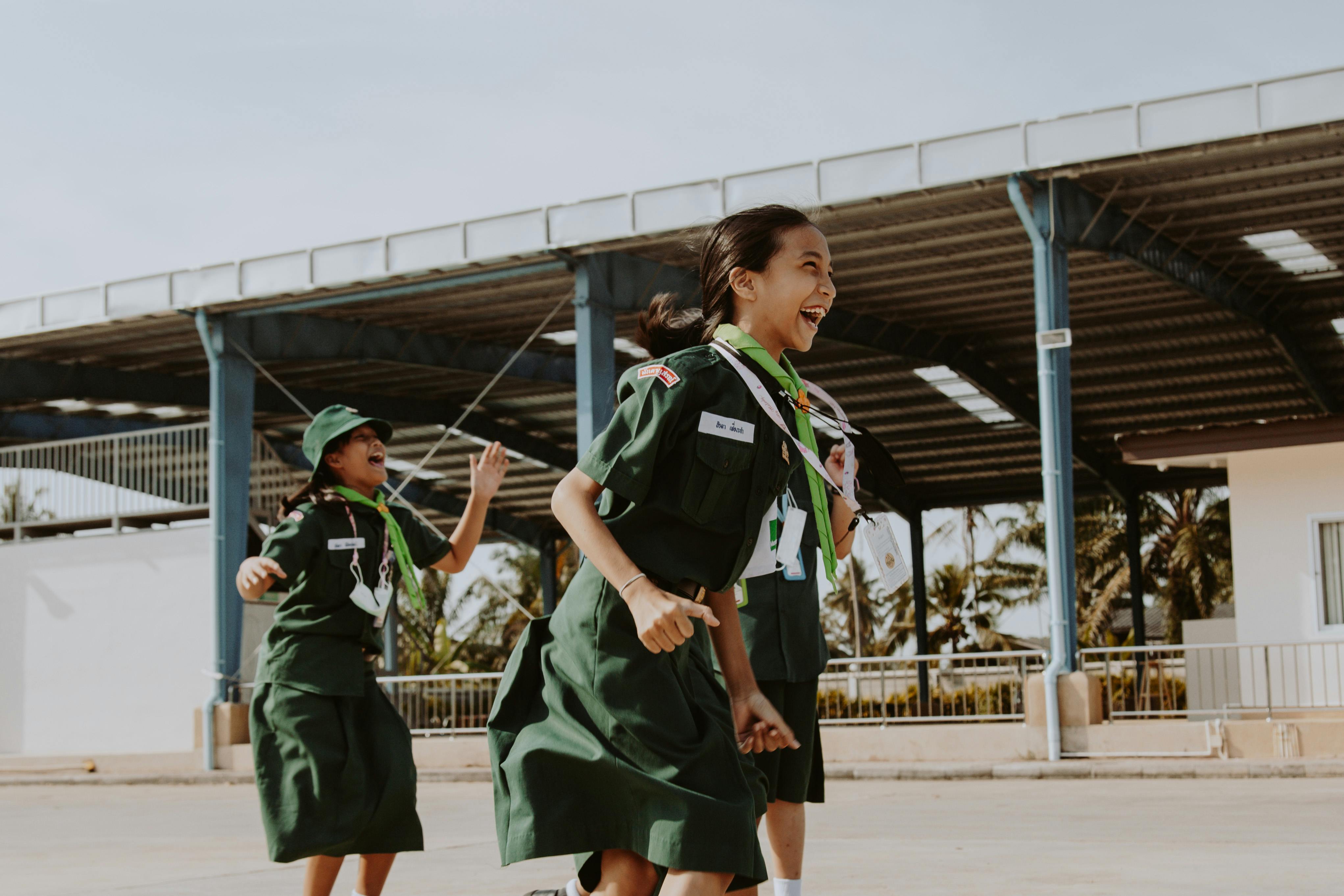 Girl With Orange Hair Flipping While Holding Rope · Free Stock Photo