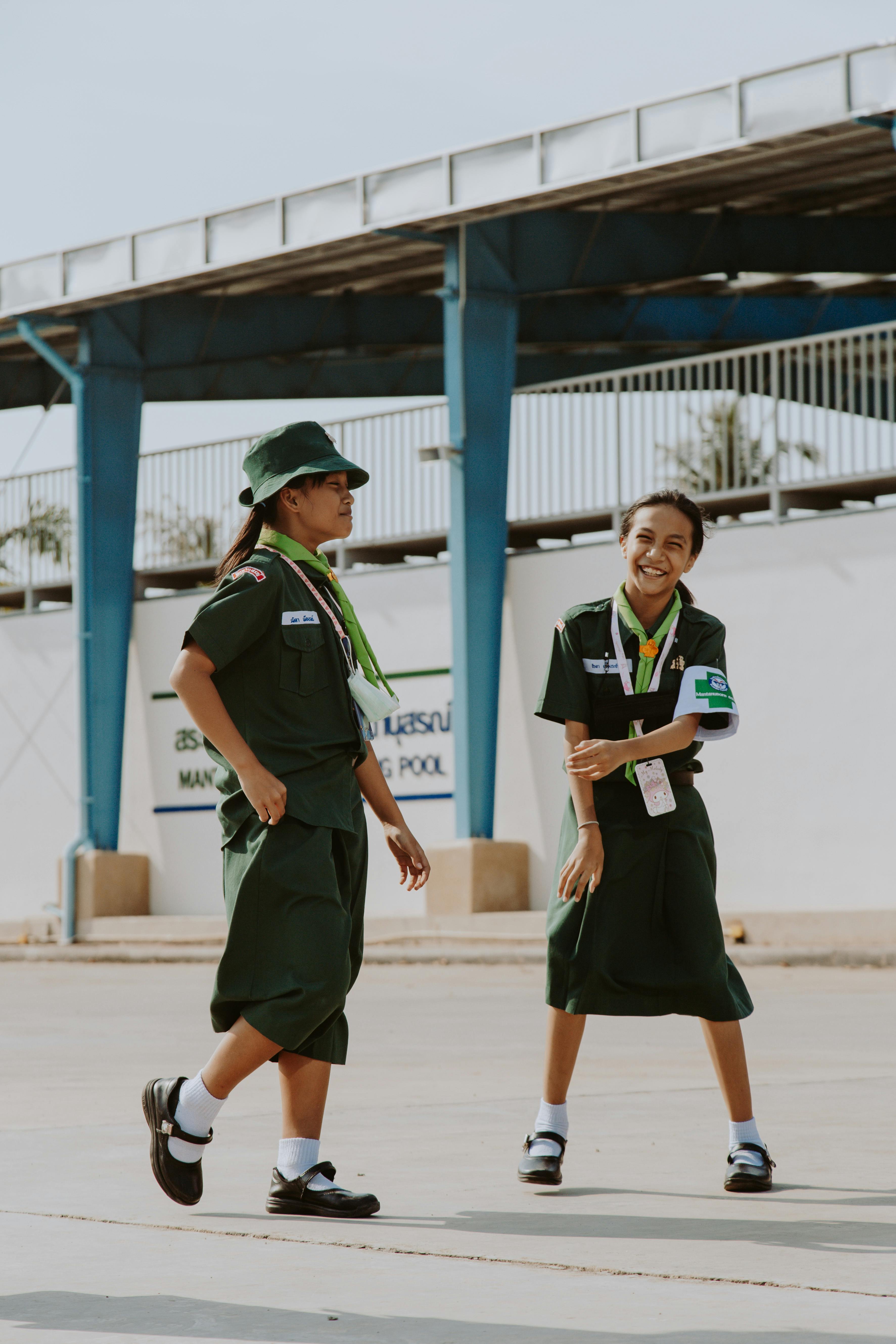 Smiling Scout Girls Outdoors · Free Stock Photo