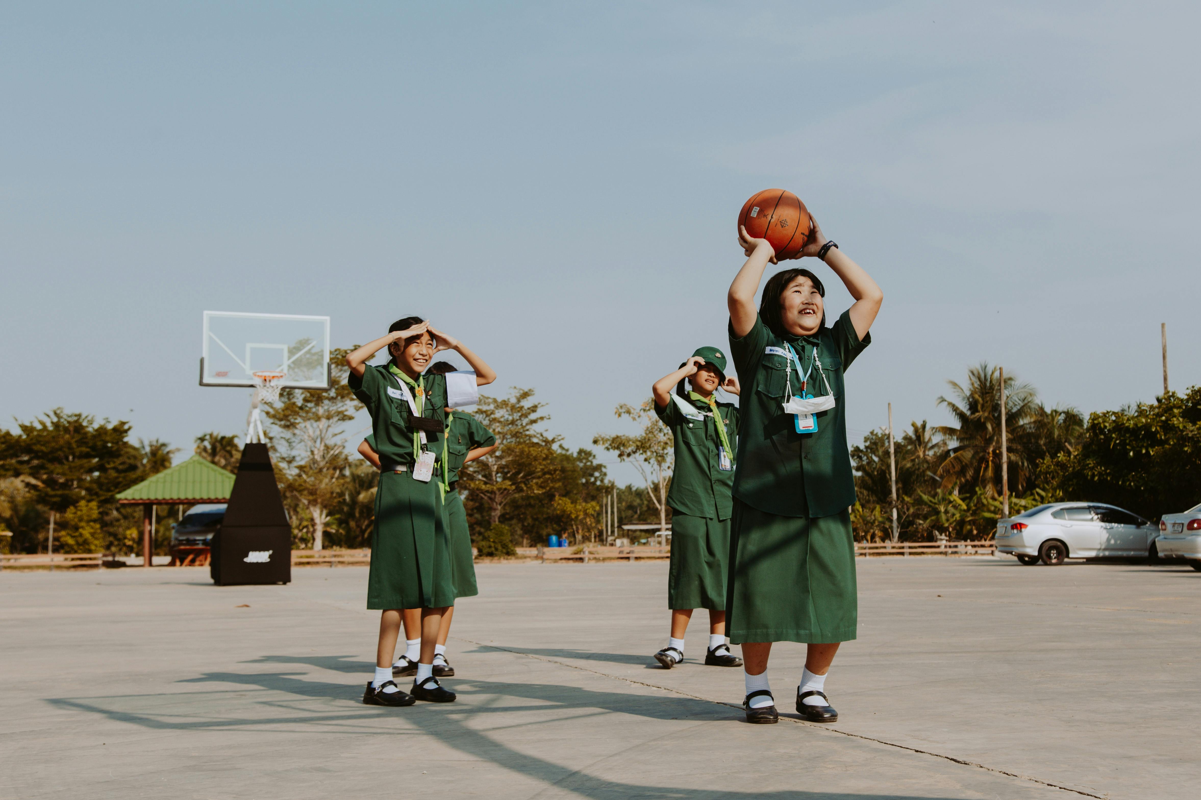 Scout Girls Playing Basketball · Free Stock Photo