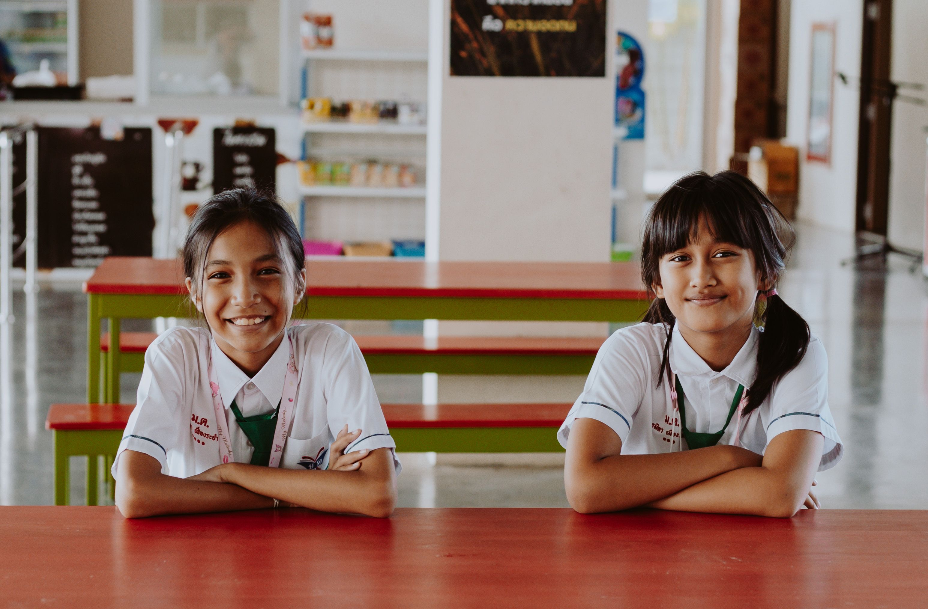 Photo of Four Girls Wearing School Uniform Doing Hand Signs · Free ...