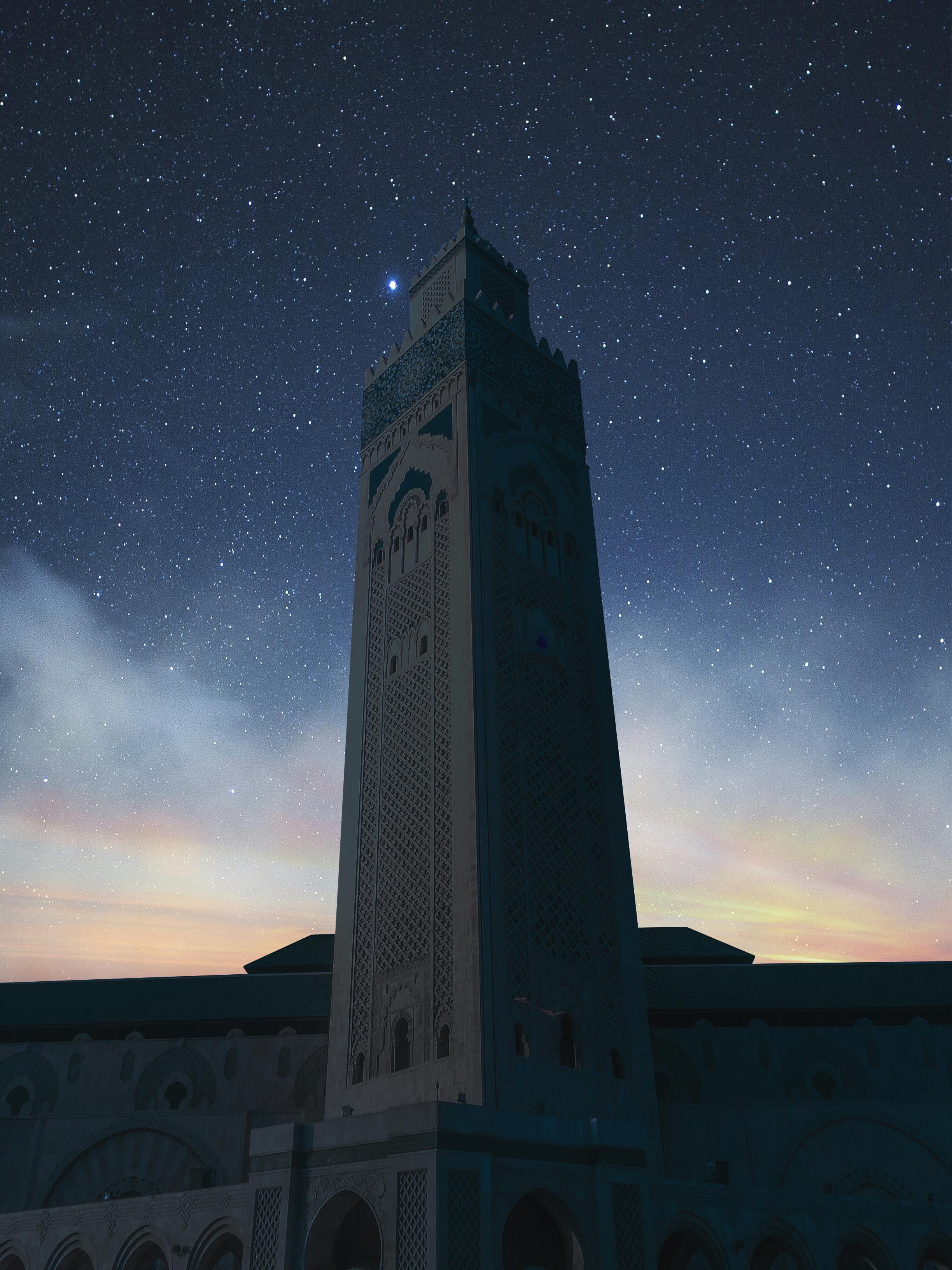 Man Standing Under An Arch Of Building · Free Stock Photo